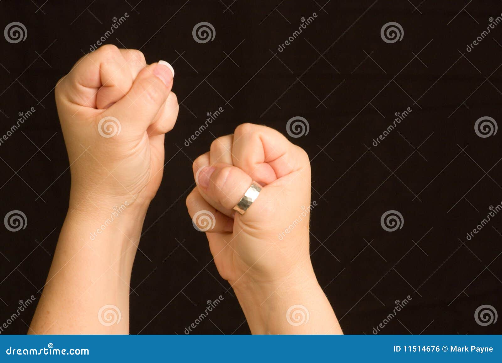 Hands Clenched Fists Isolated On A White Background. Close-up Of Female ...