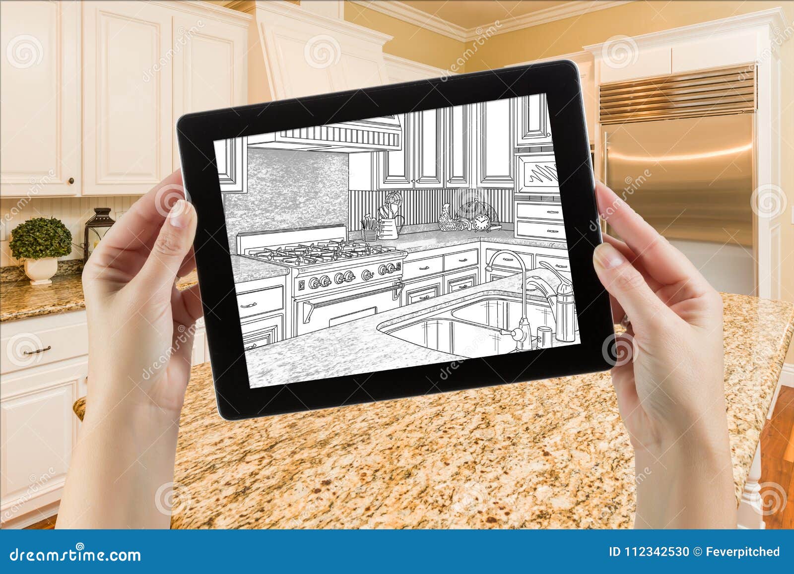 Female Hands Holding Computer Tablet with Drawing on Screen of Kitchen ...