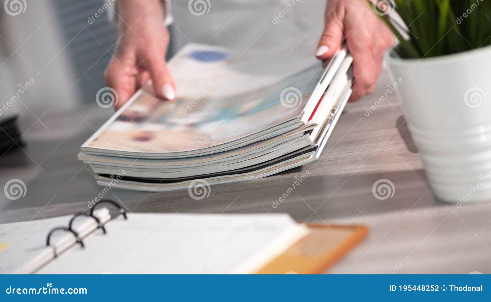 Female Hands Holding Magazines Stock Photo - Image of paper ...