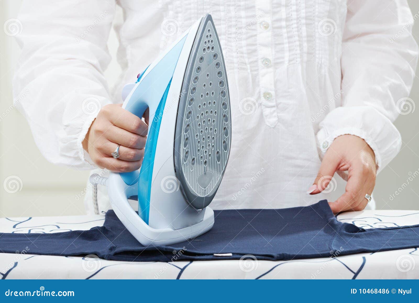 Female hands ironing stock photo. Image of female, detailed - 10468486