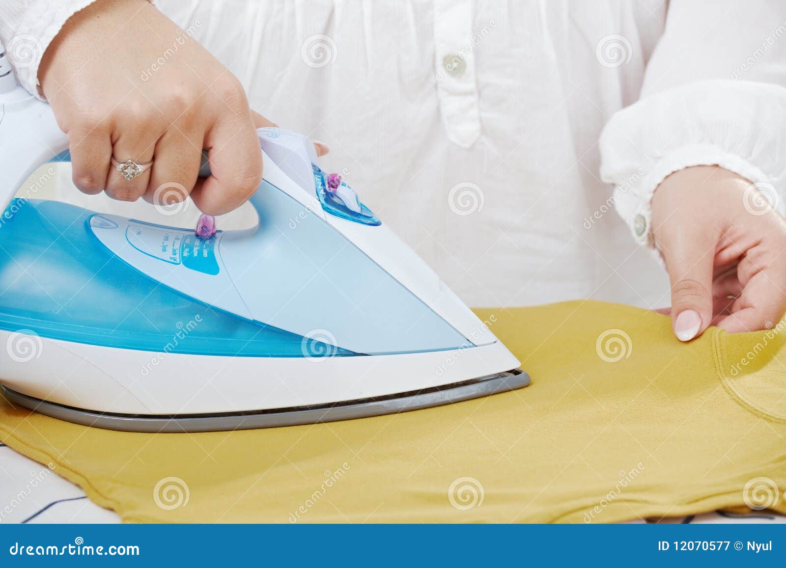 Female hands ironing stock image. Image of lifestyle - 12070577