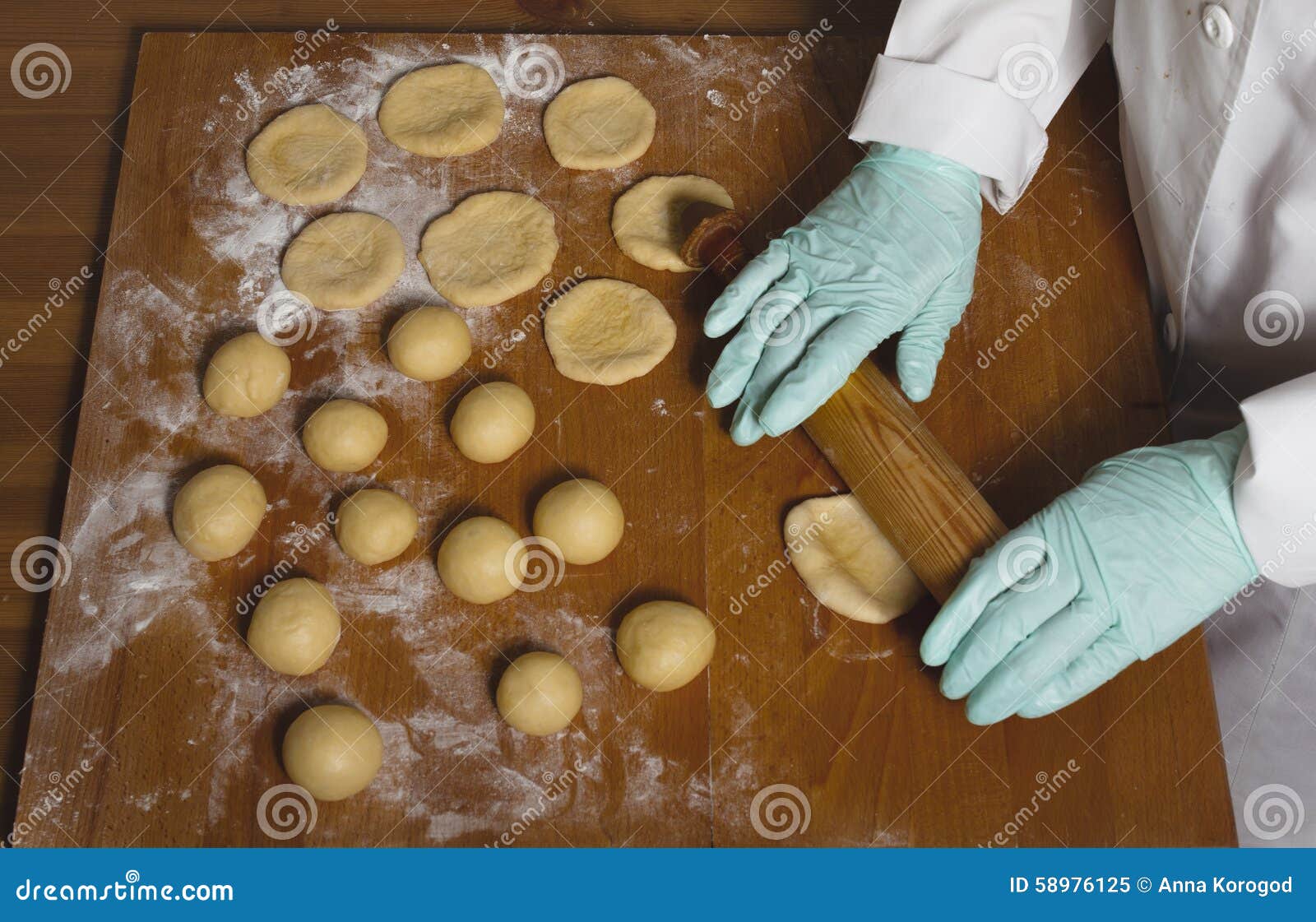 Female hands make cookies stock image. Image of dining - 58976125