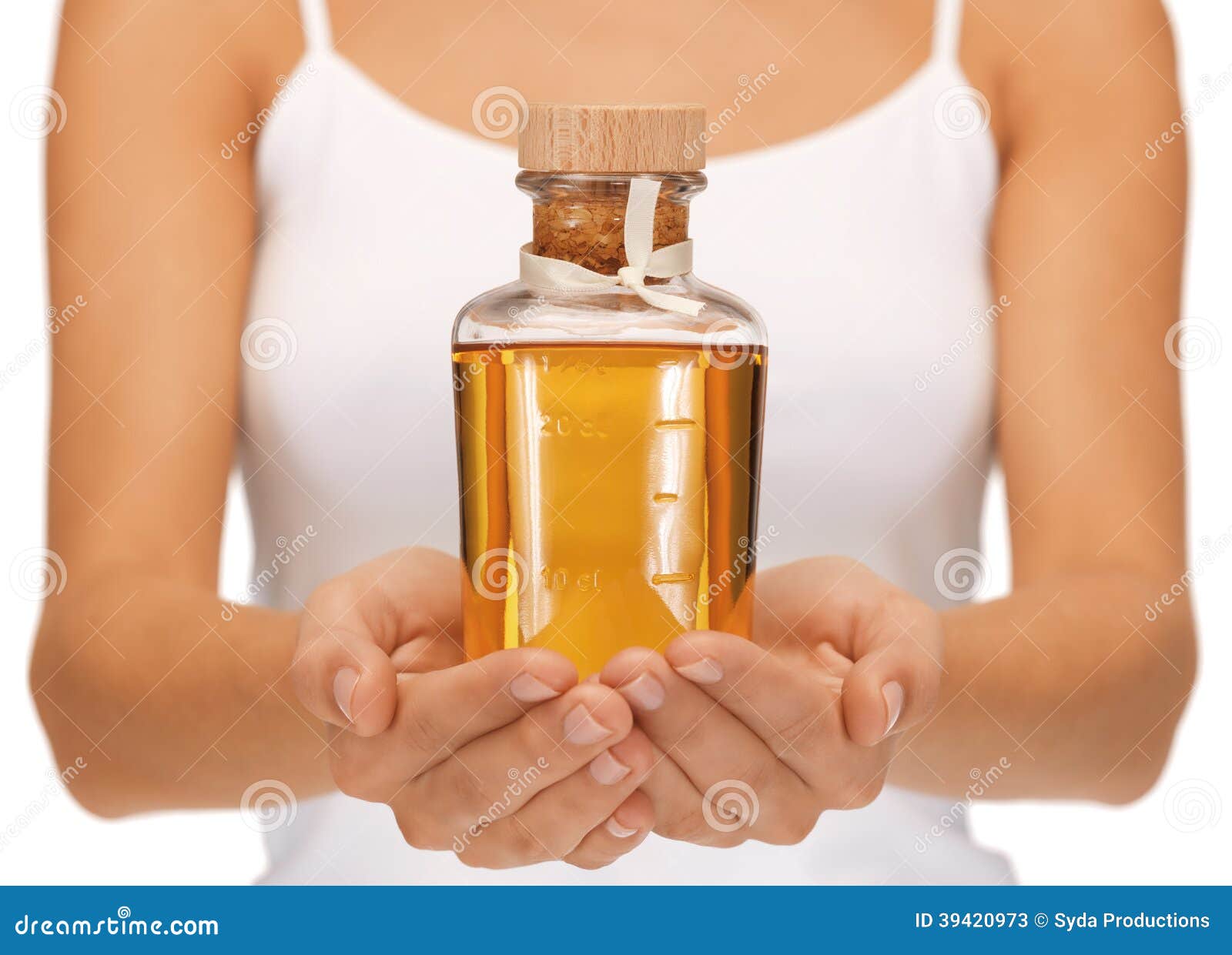 Female Hands with Oil Bottle Stock Image - Image of fluid, bottle: 39420973