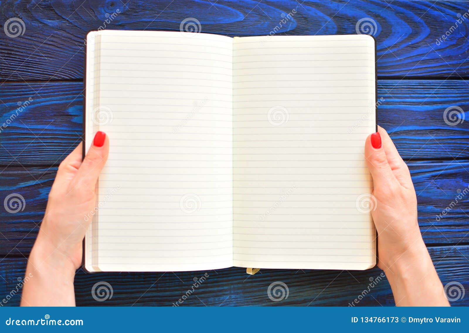 Female Hands with the Opened Paper Notebook with an Empty Pages. Stock ...