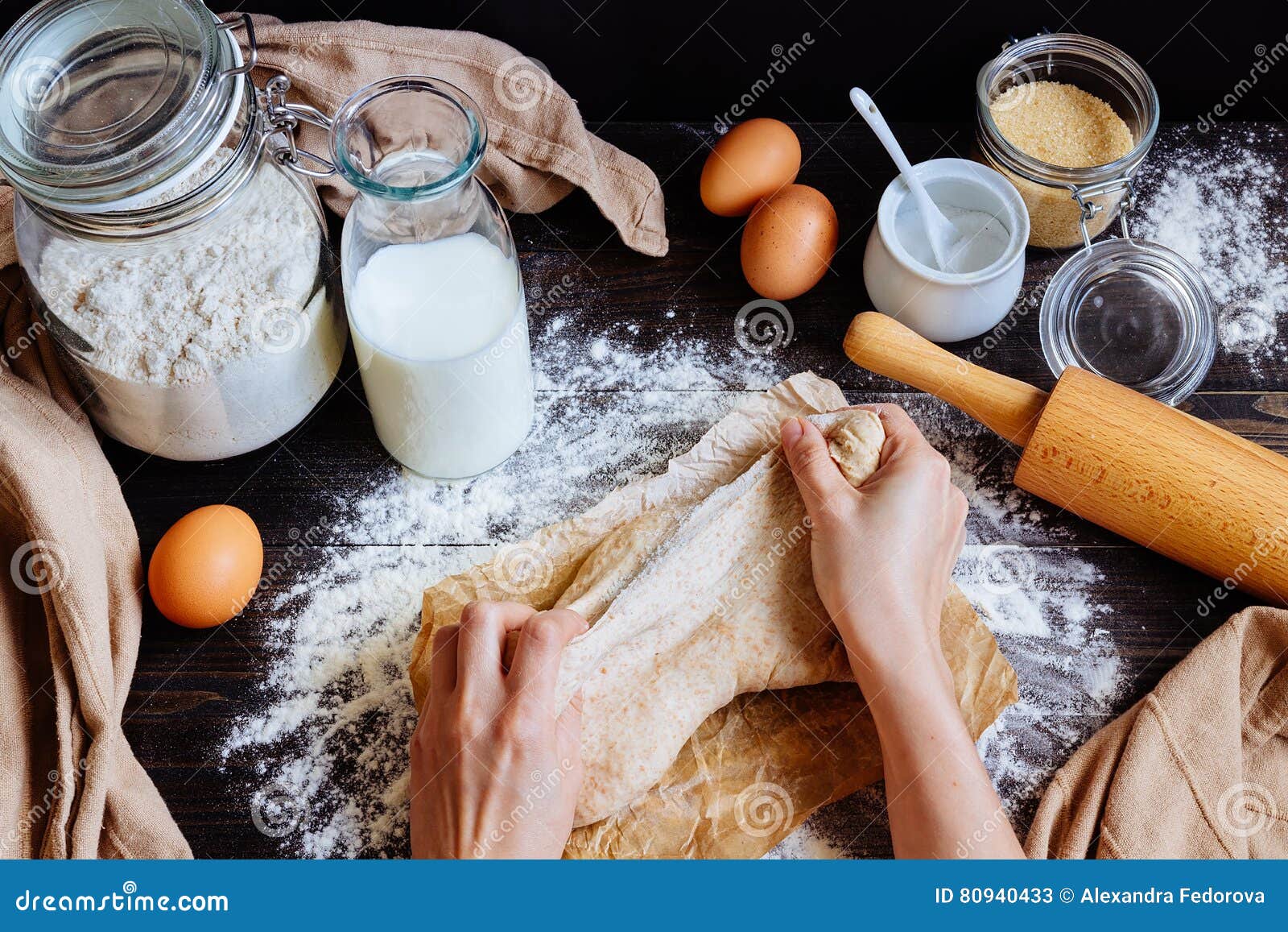 Female Hands Preparing Dough in the Kitchen. Baking Ingredients on the ...