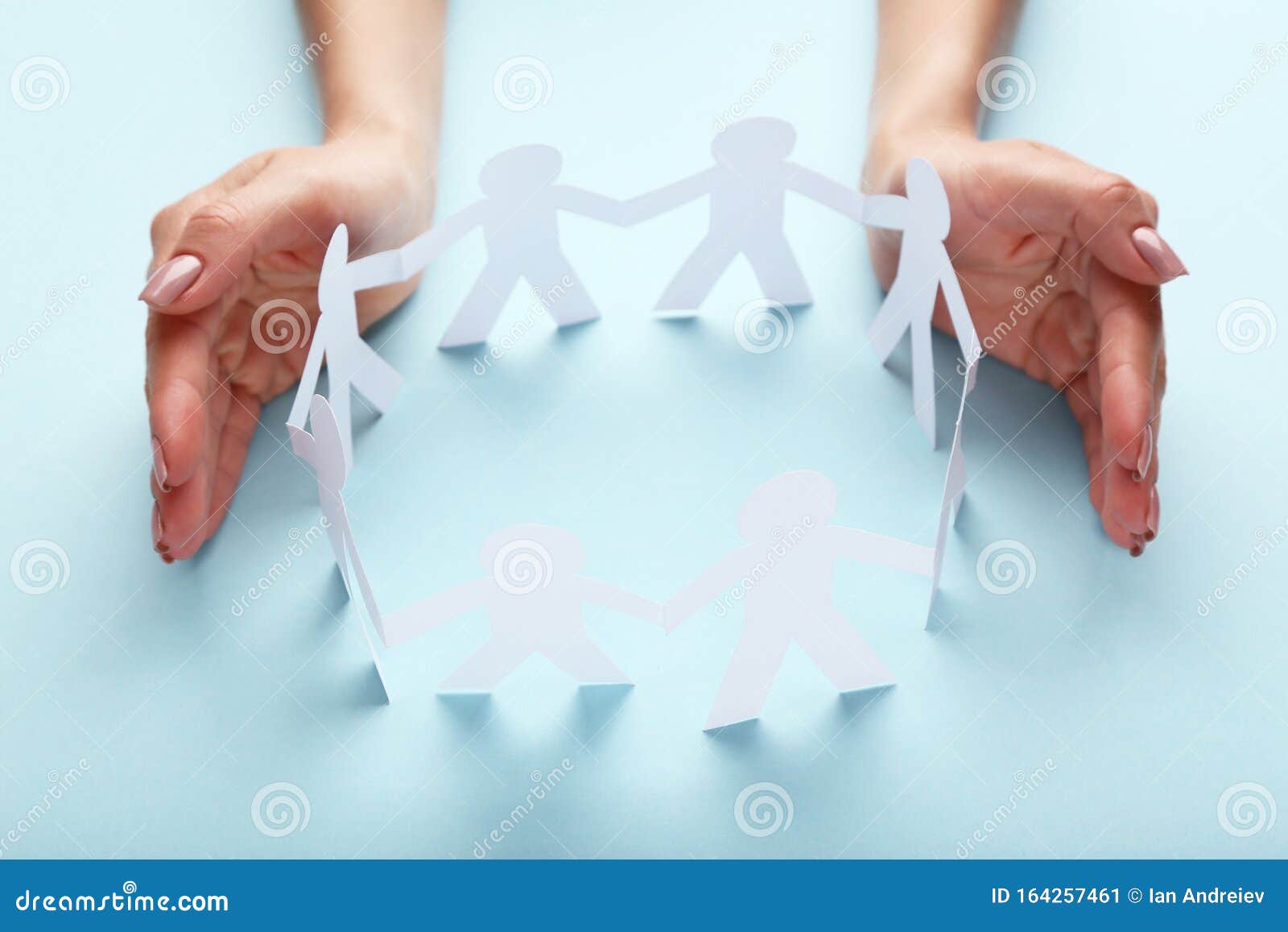 Hands Protecting Paper Chain People Stock Image - Image of care, group ...