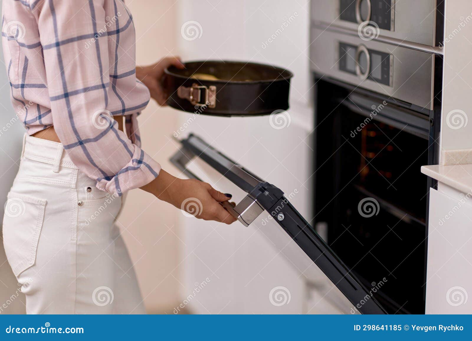 Female Hands Put Pan of Dough into Kitchen Oven. Stock Image - Image of ...