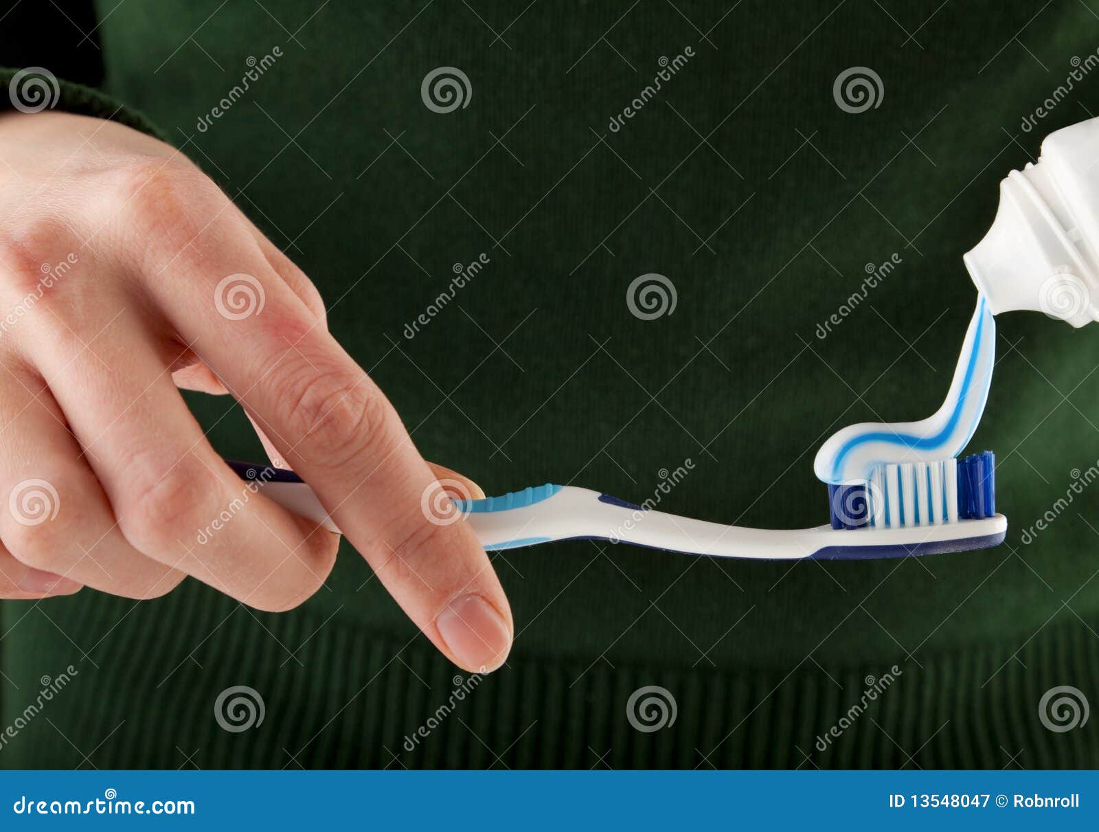 Female Hands Putting Toothpaste On The Toothbrush Royalty Free Stock ...
