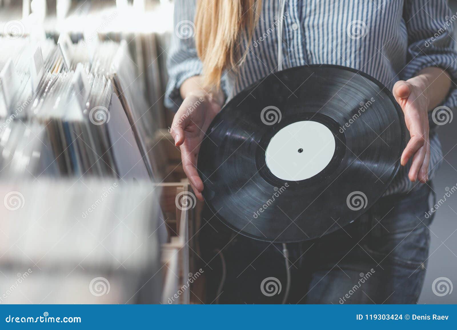 Female hands with a record stock photo. Image of choice - 119303424