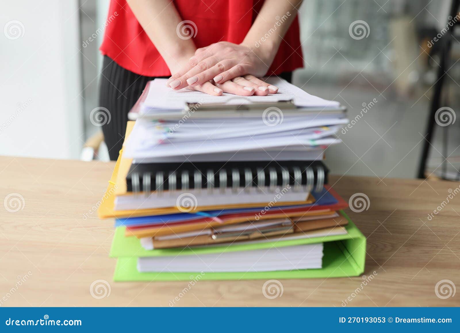Female Hands Rest on a Stack of Folders on the Table Stock Image ...