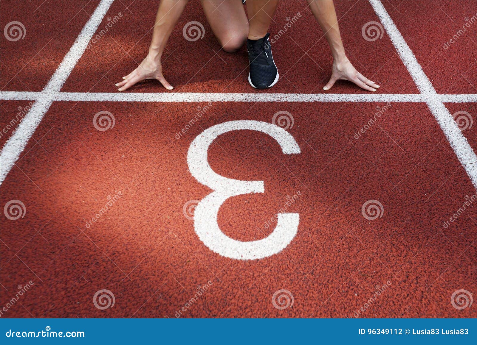 Female Hands on Starting Line Waiting for the Start in Running Track ...
