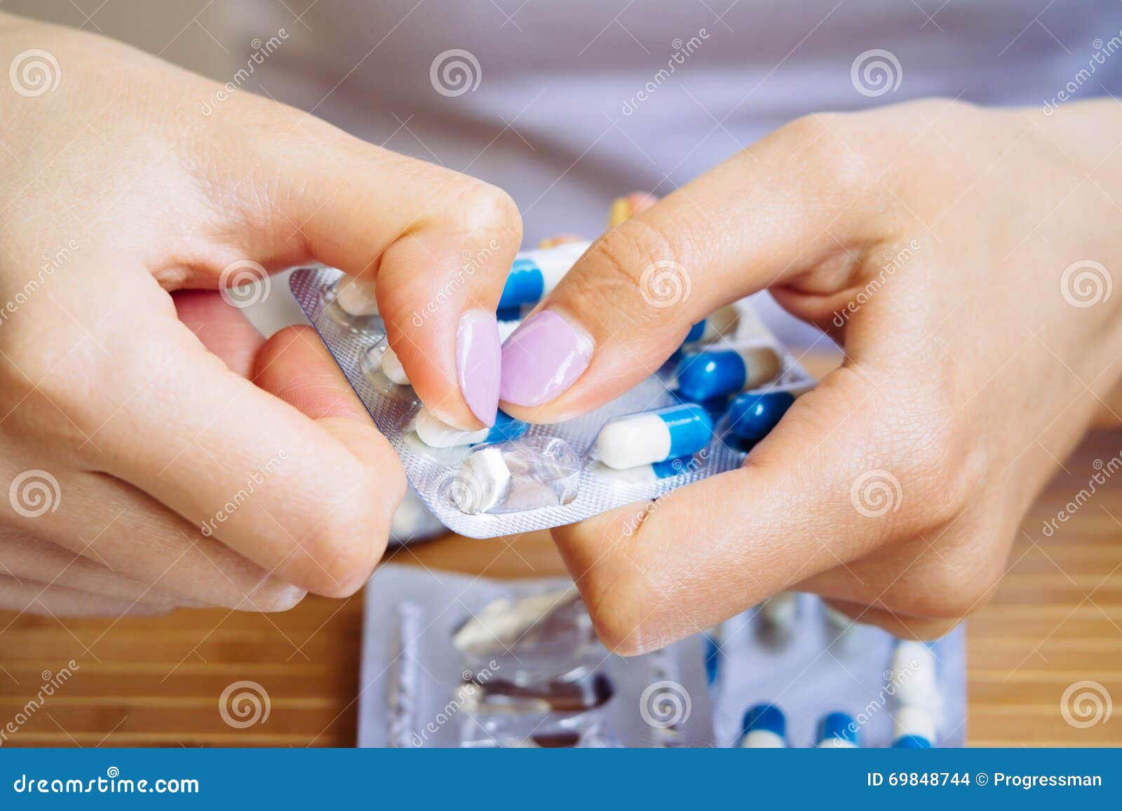 Female Hands Take Out the Capsule Pill from the Blister Stock Photo ...