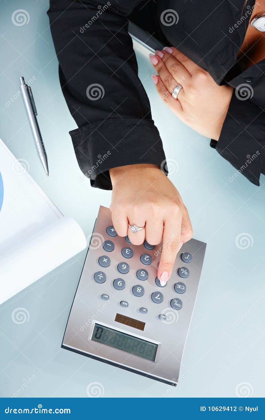 Female Hands Using Calculator Stock Photo - Image of nail, close: 10629412