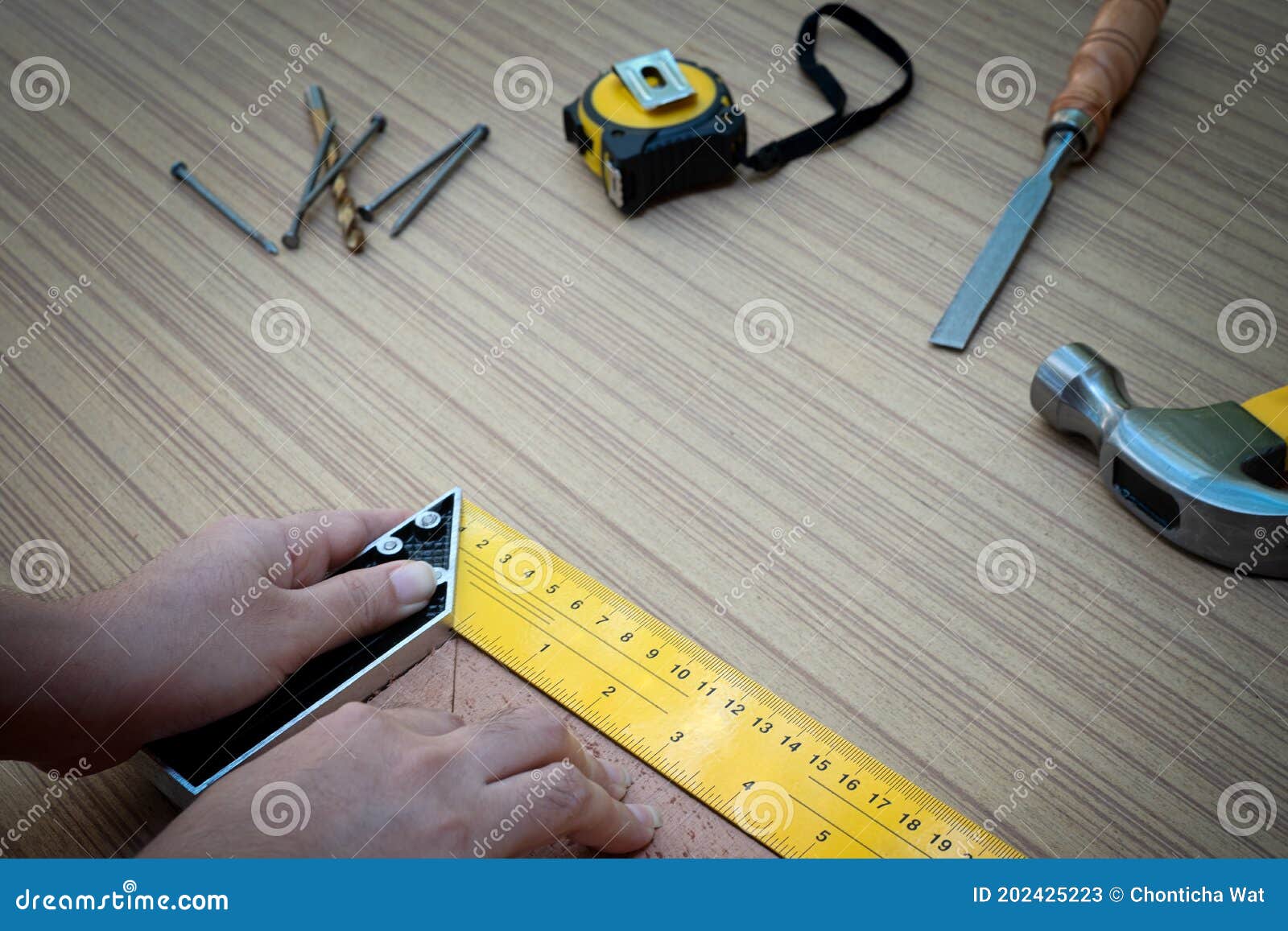 Female Hands Using a Try Square To Check that the Woodworking Corners ...