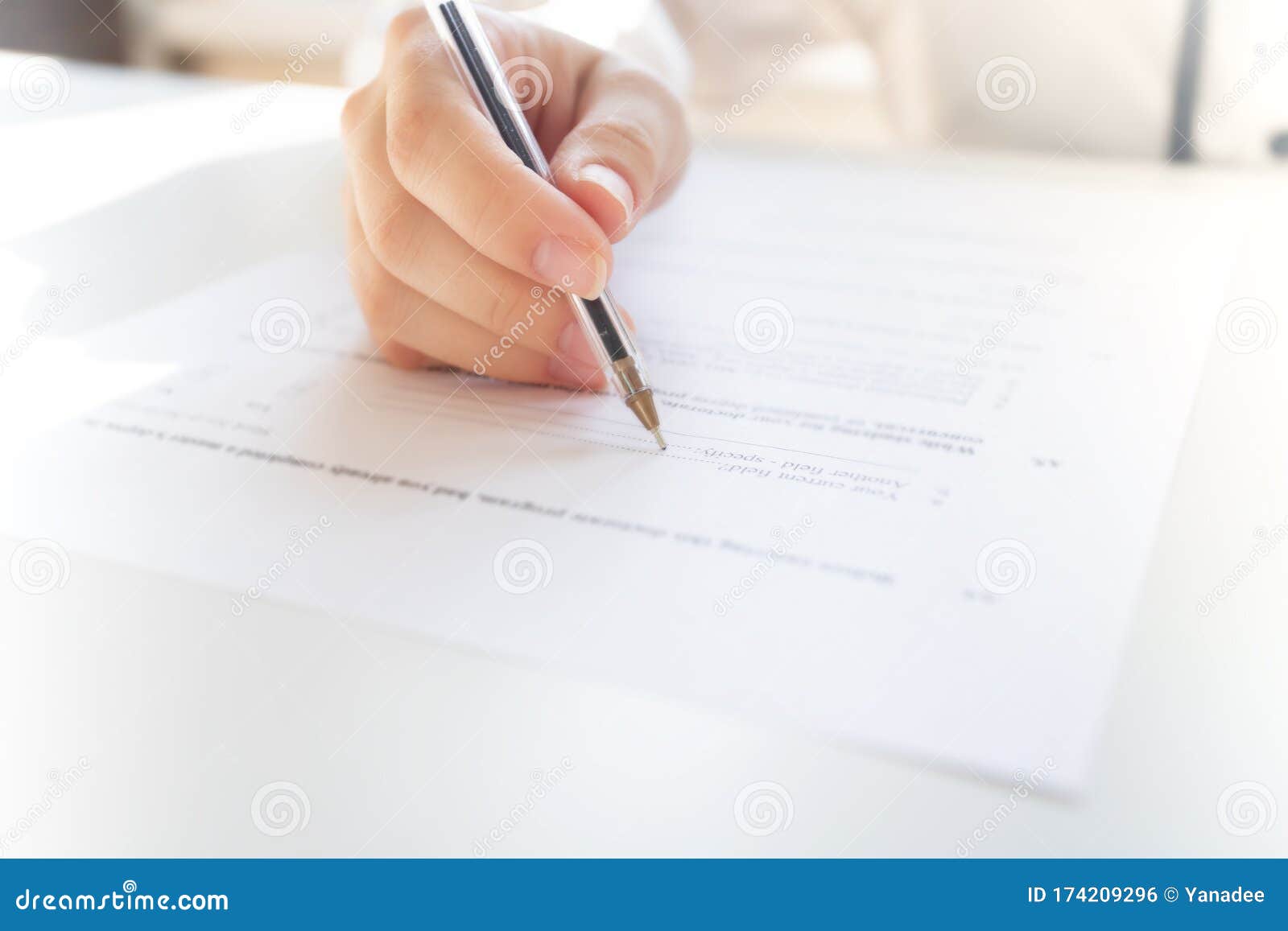 Female Hands Write with a Pen on a Sheet of Paper, Fill Out a ...