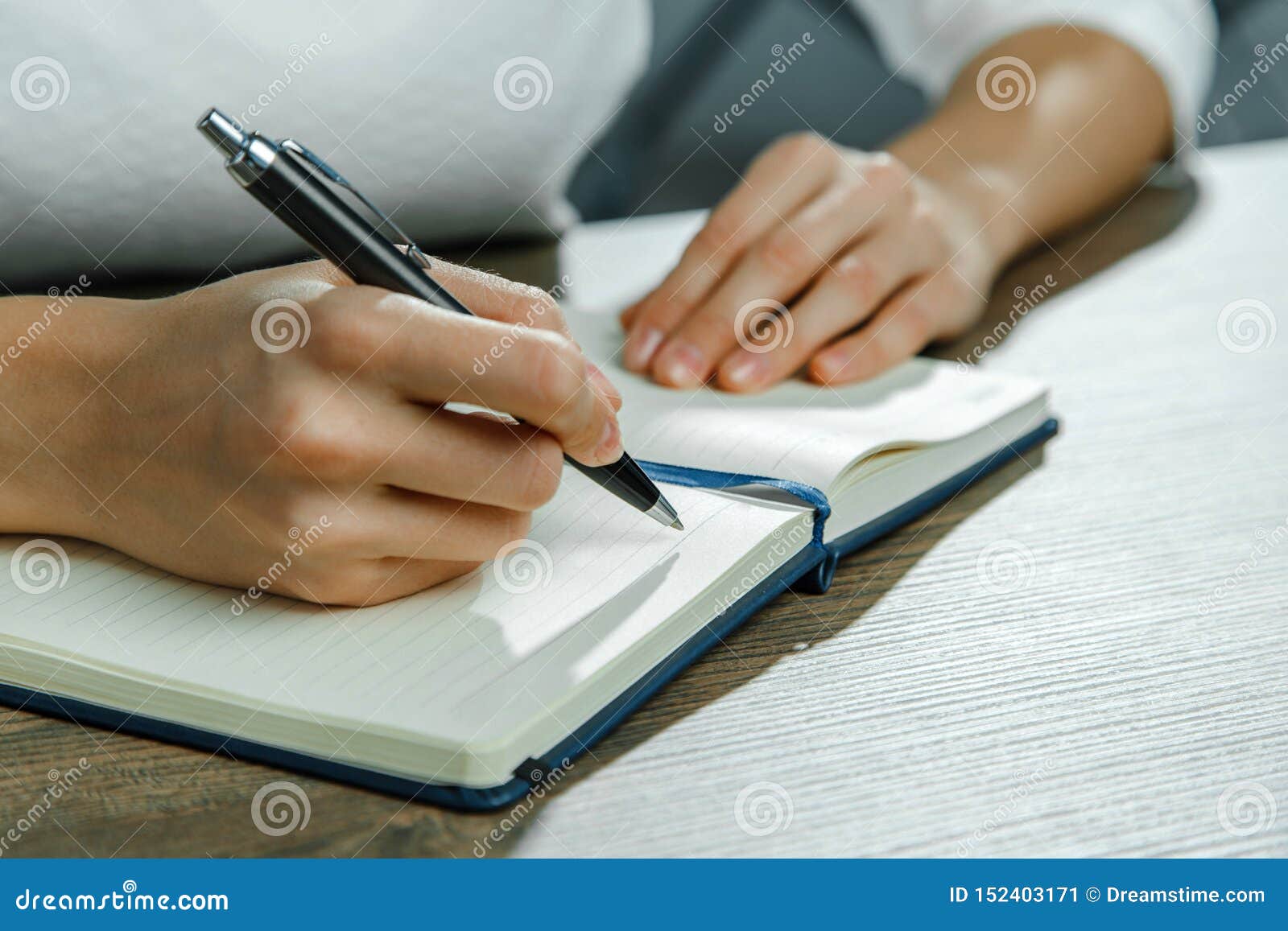 Female Hands are Writing in a Notebook Stock Image - Image of holding ...