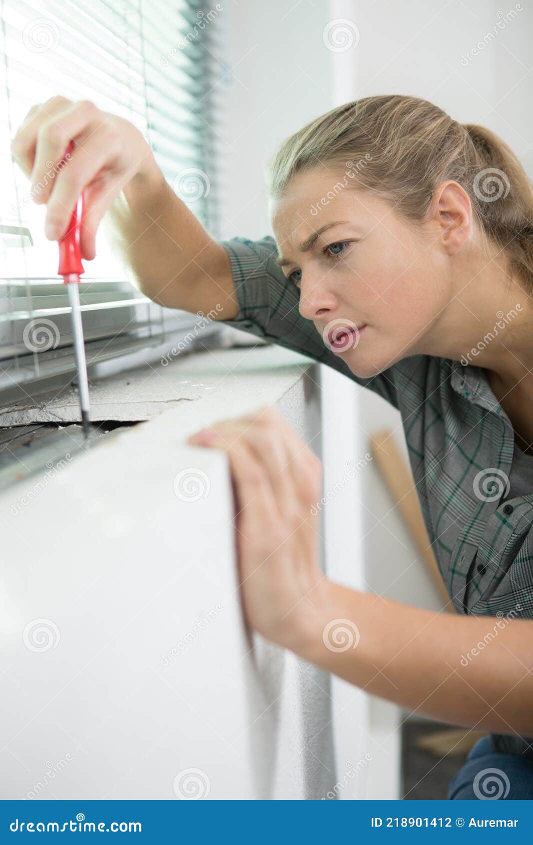 Female Handyman Using Screwdriver Stock Photo - Image of manufacturing ...