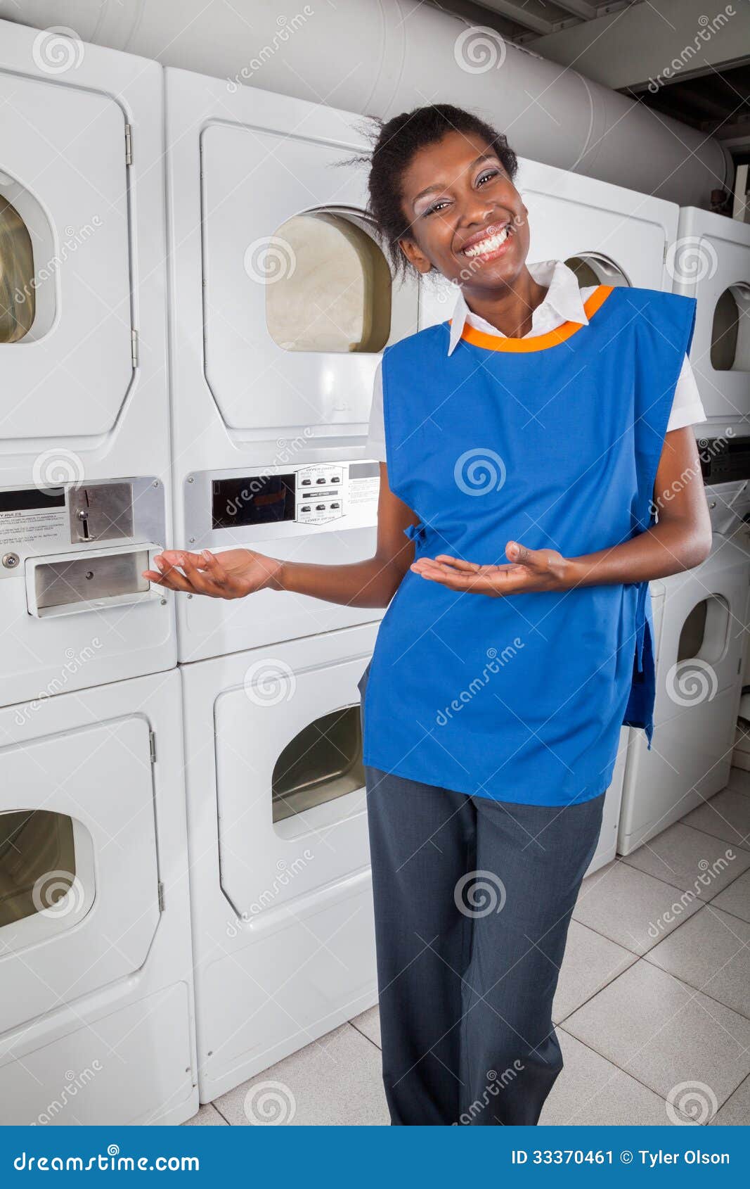 Female Helper Gesturing in Laundry Stock Image - Image of appliance ...