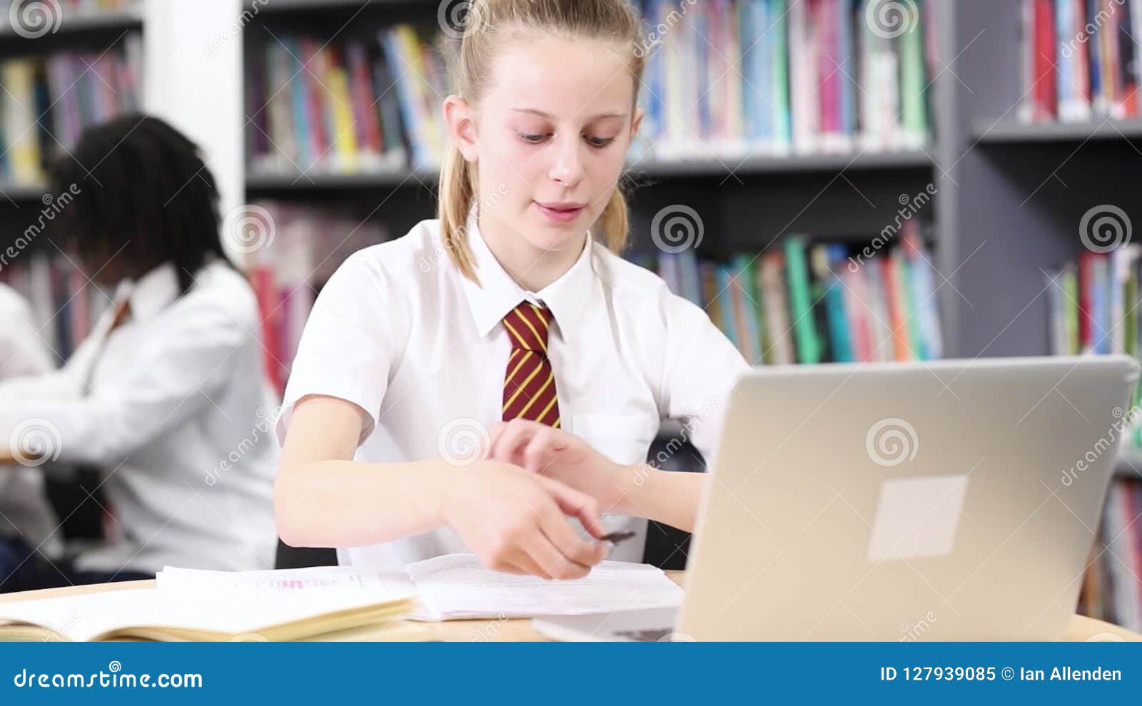 Female High School Student Wearing Uniform Working at Laptop Stock ...