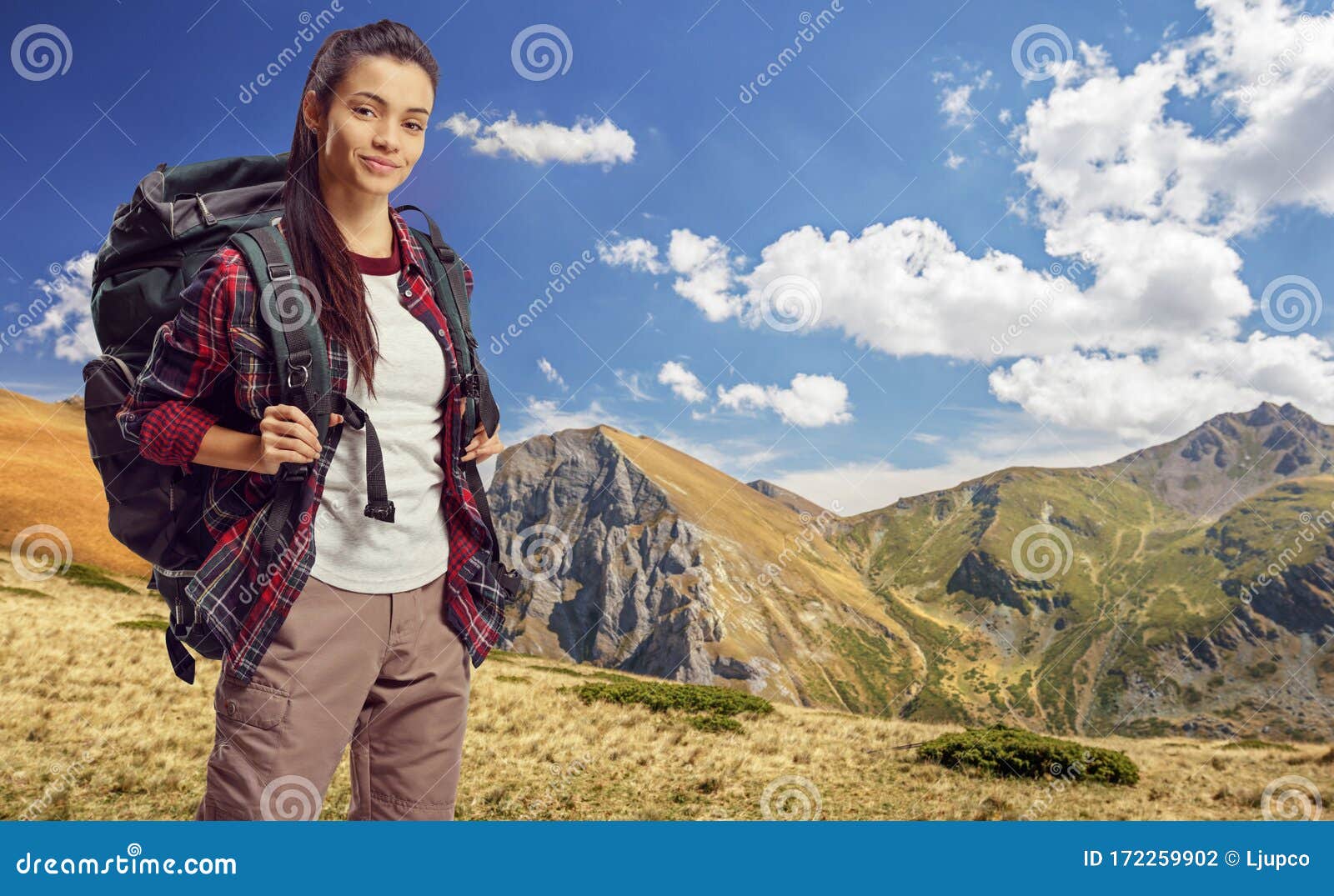 Female Hiker with a Backpack Climbing a Mountain Stock Photo - Image of ...