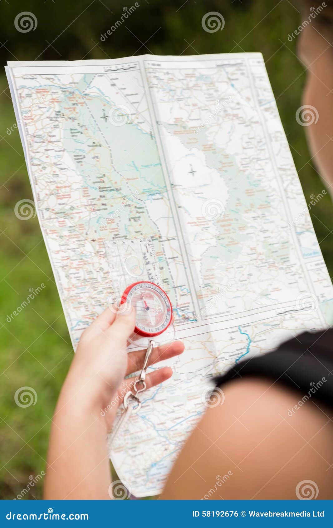 Female Hiker with Compass and Reading Map Stock Photo - Image of ...