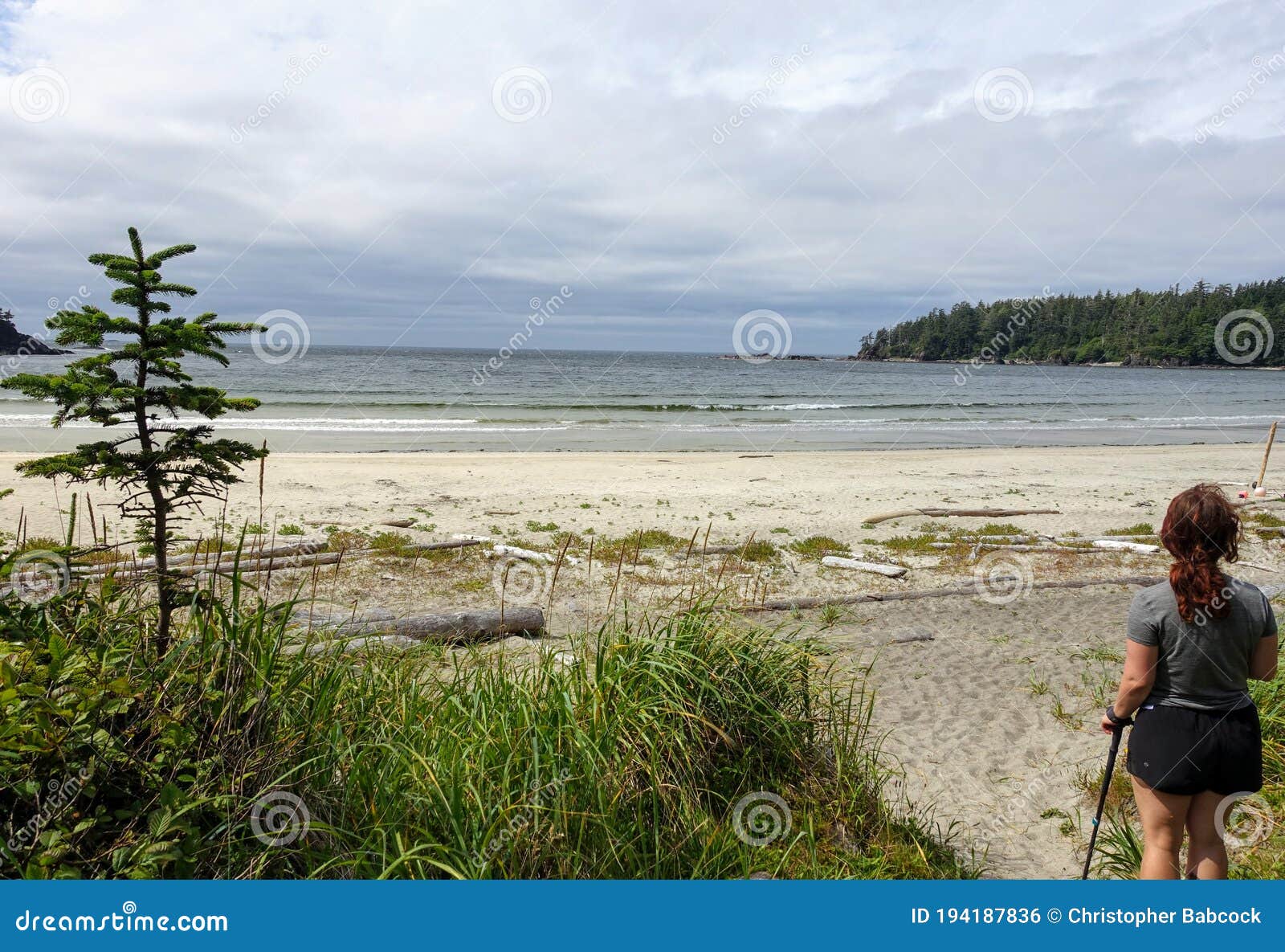 A Female Hiker Exploring the Sandy Beaches of Nels Bight and ...