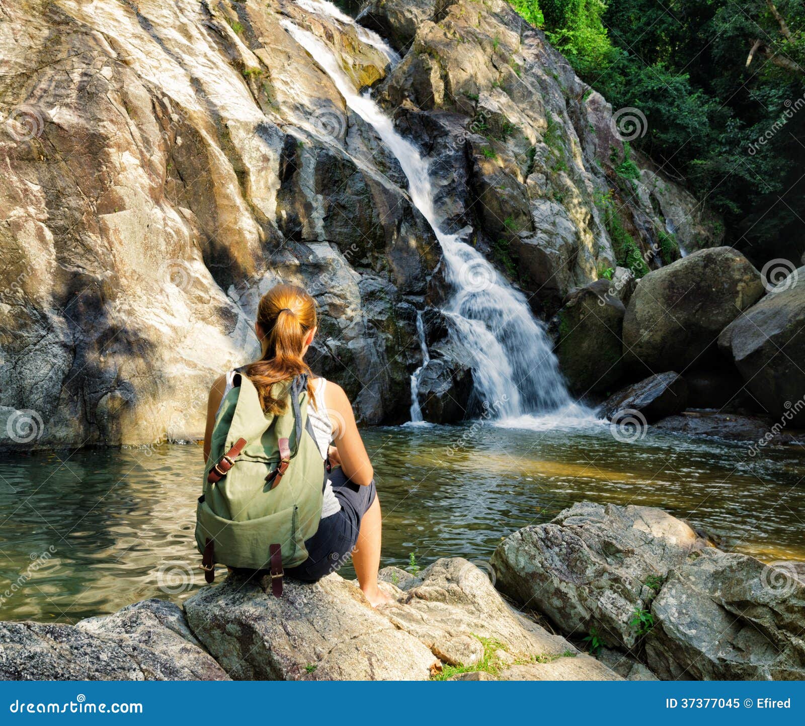 Female Hiker Looking at Waterfall Stock Image - Image of person ...
