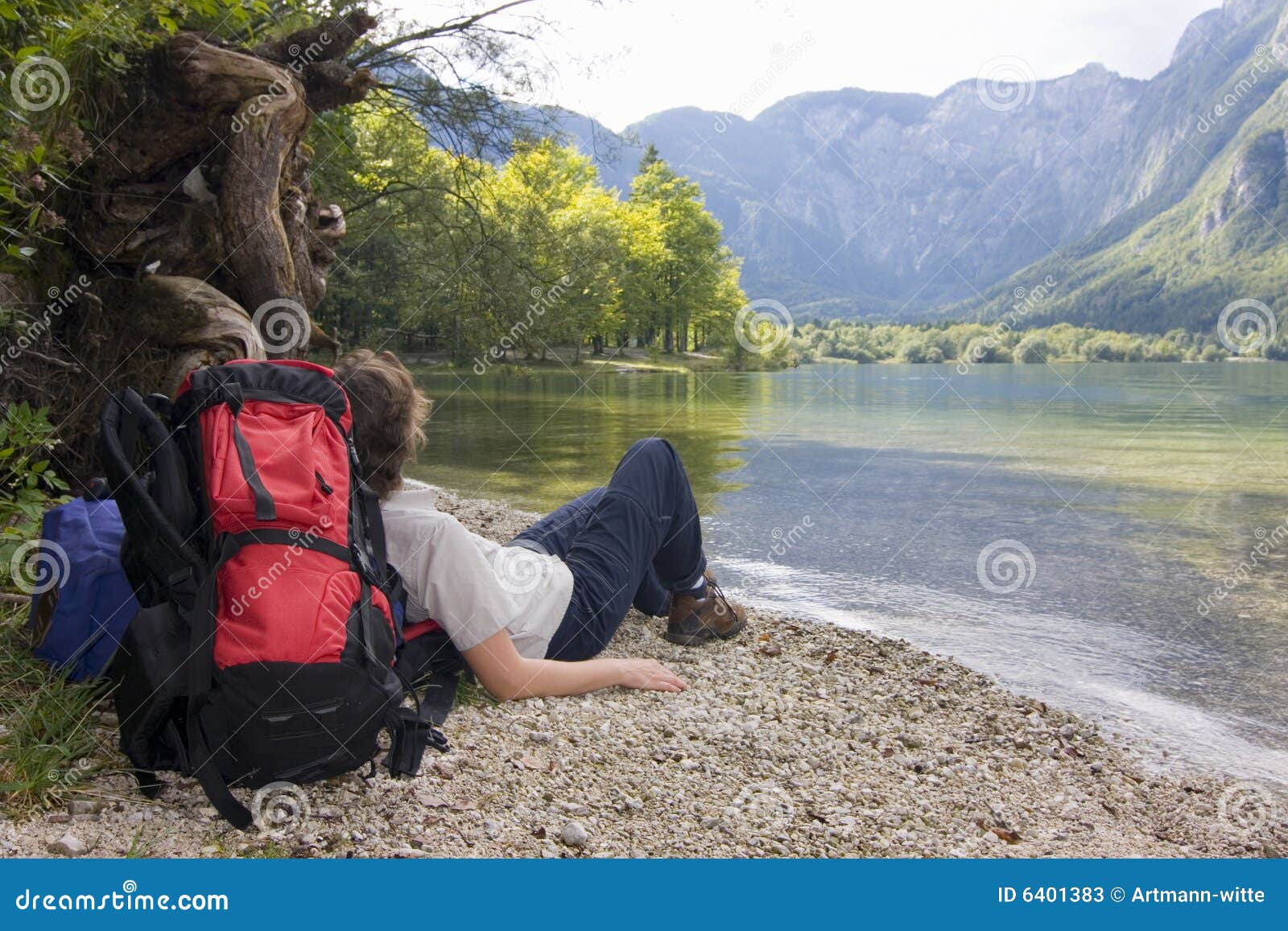 Female Hiker Resting at a Mountain Lake Stock Image - Image of water ...