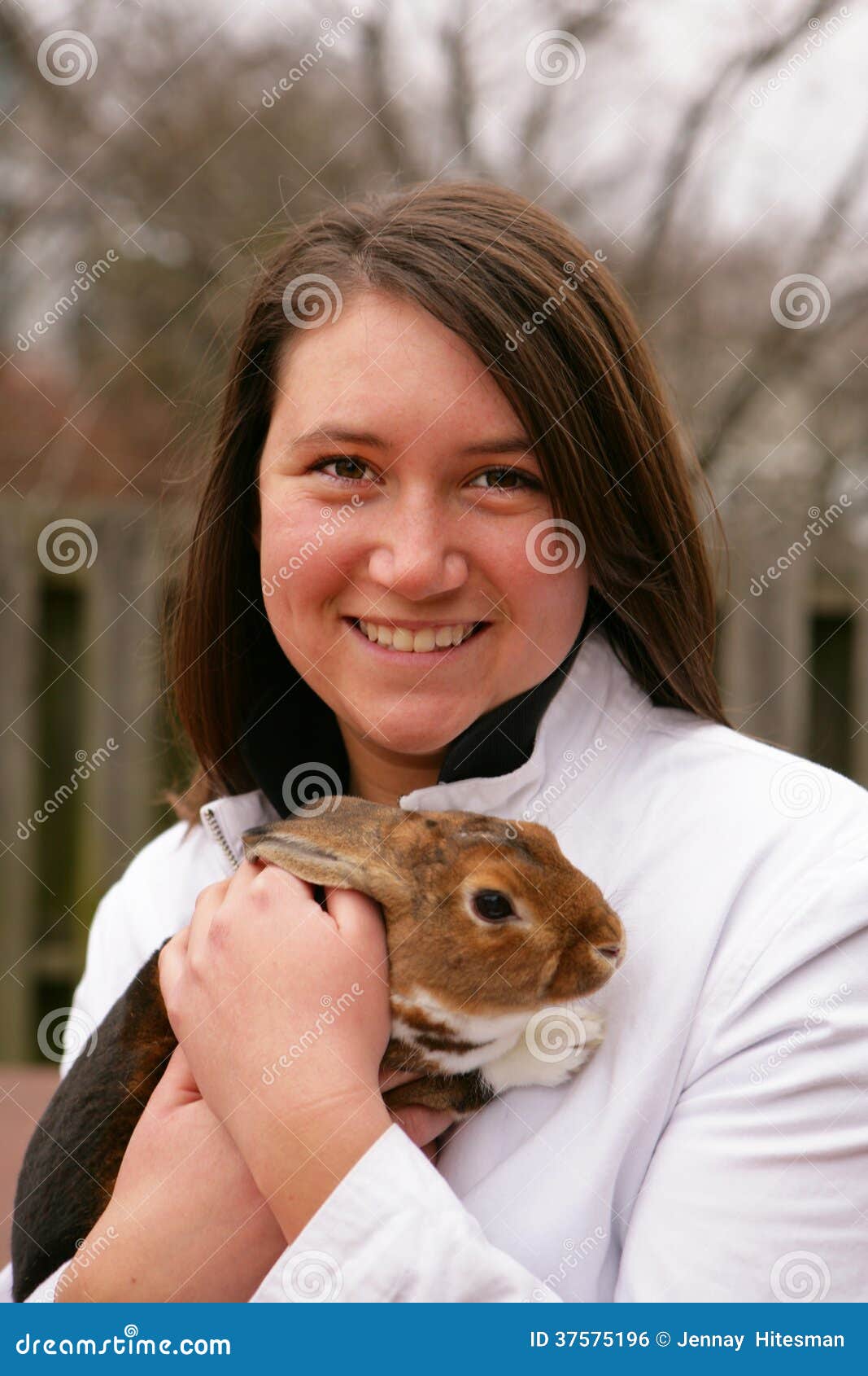 Female holding a rabbit stock photo. Image of bunny, smile - 37575196