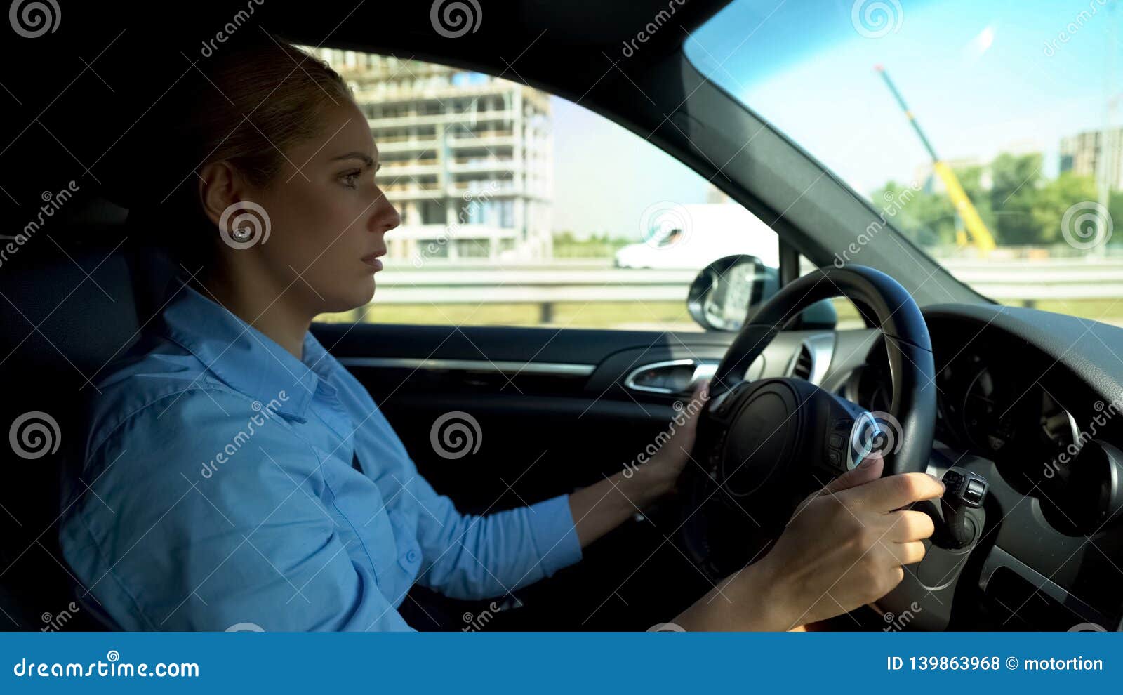 Female Holding Steering Wheel, Thinking about Problems, Conflict at ... Female Holding Steering Wheel, Thinking about Problems, Conflict at ...