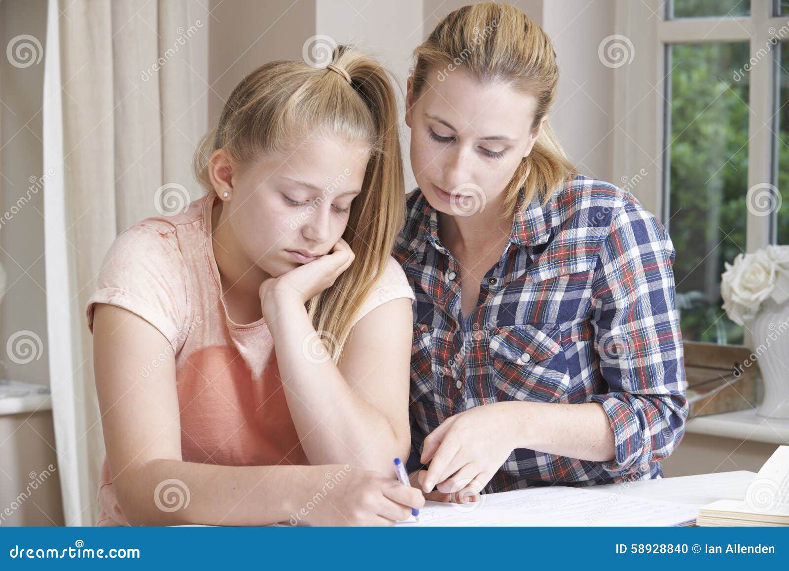 Female Home Tutor Helping Girl with Studies Stock Photo - Image of ...