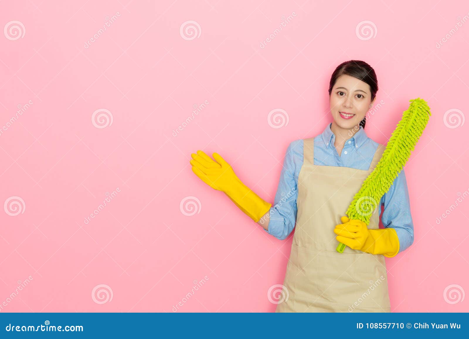 Female House Worker Making Presentation Posture Stock Photo - Image of ...