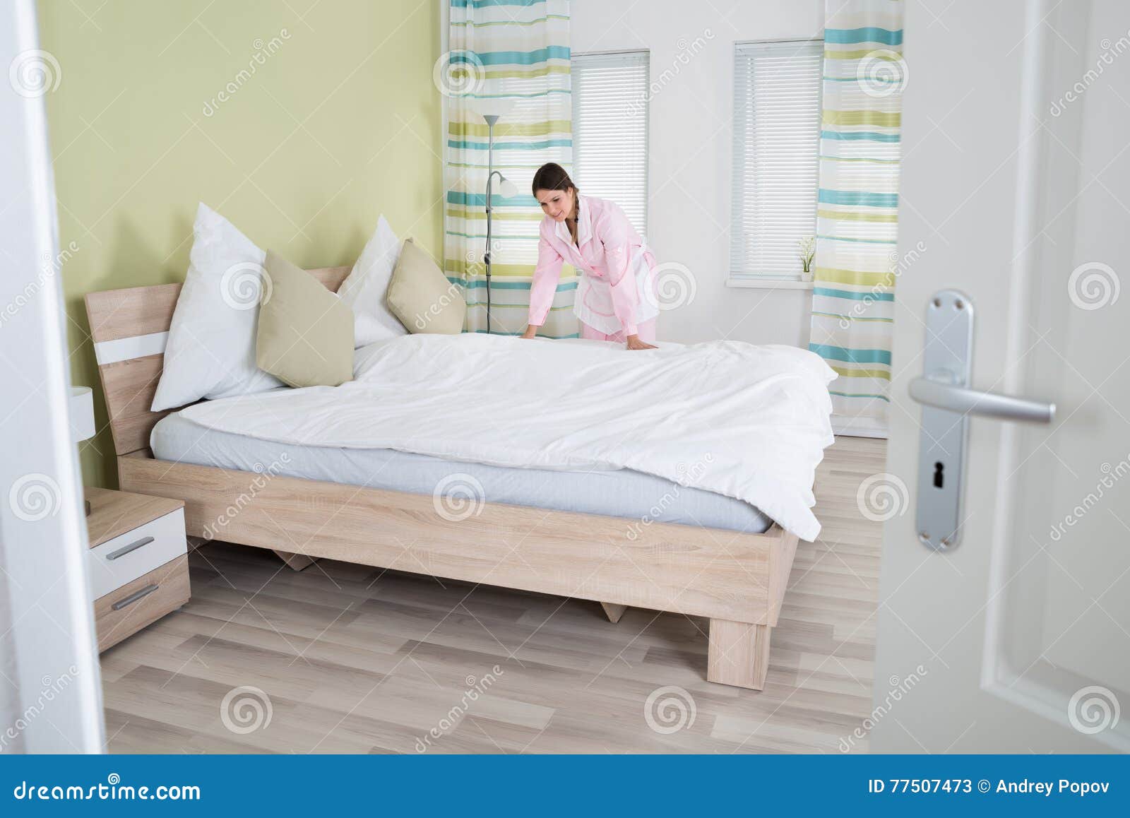 Female Housekeeper Worker Opening The Door. Room Service Maid Cleaning ...