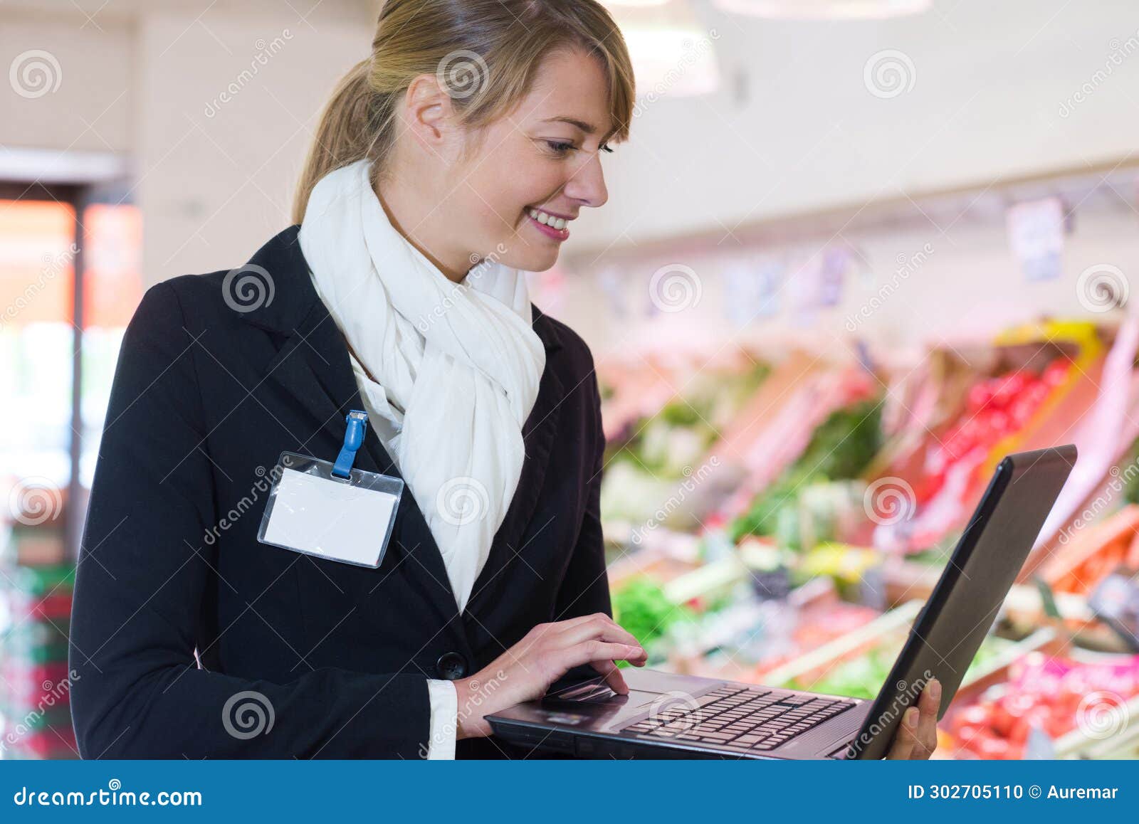 Female Inspector with Laptop in Grocery Store Stock Photo - Image of ...