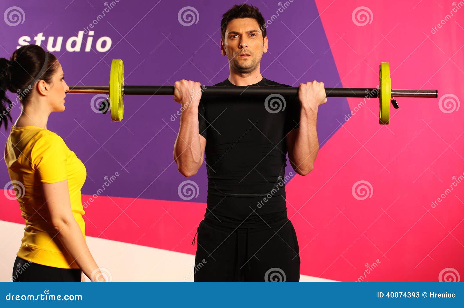 Female Instructor Explaining To a Man How To Workout Stock Image ...