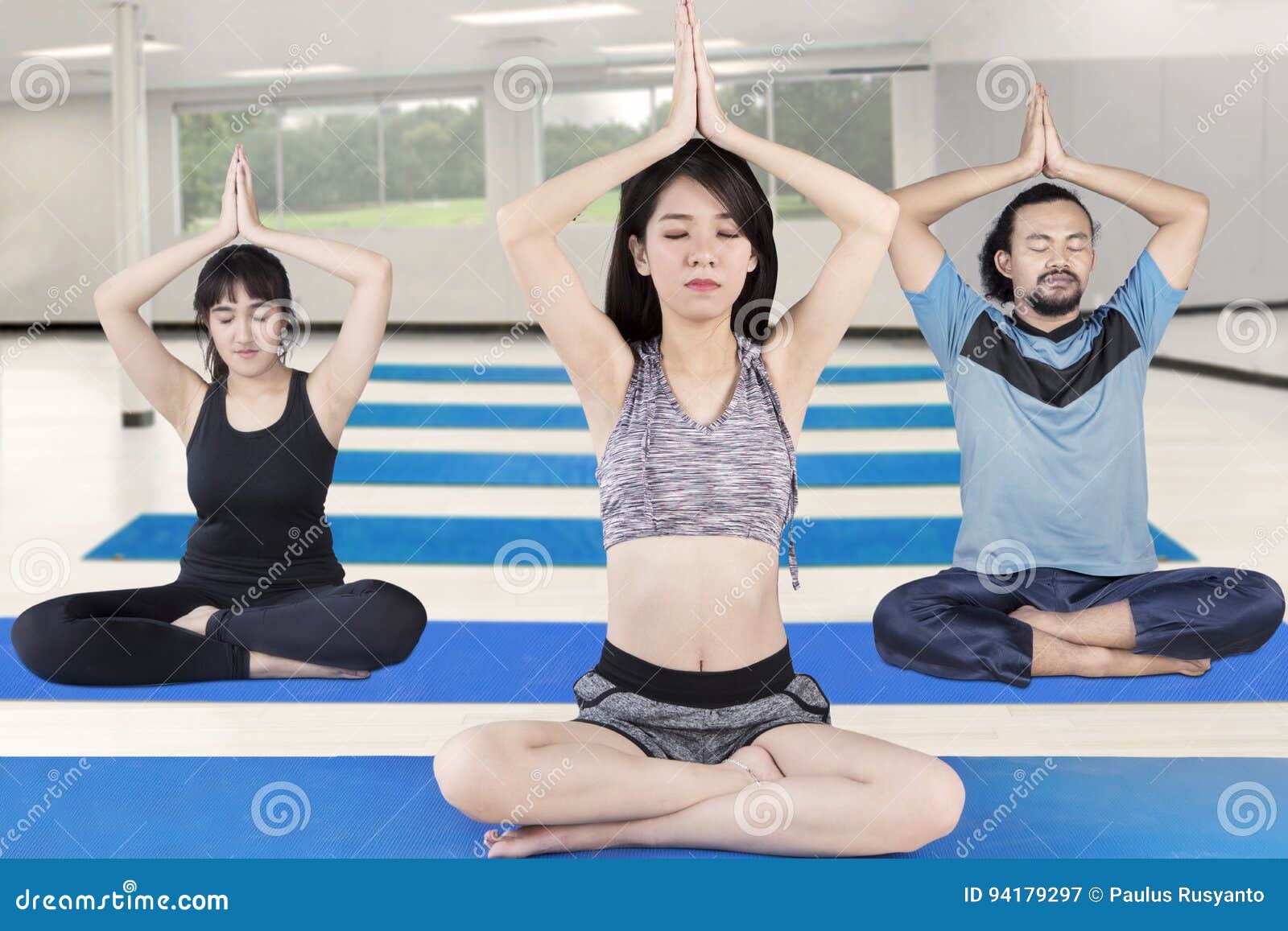Female Instructor Practicing Yoga with Her Clients Stock Image - Image ...