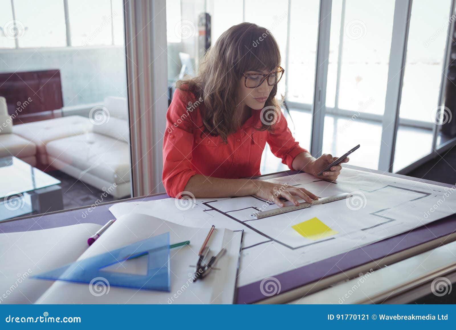 Female Interior Designer Making Plans on Papers Stock Image - Image of ...