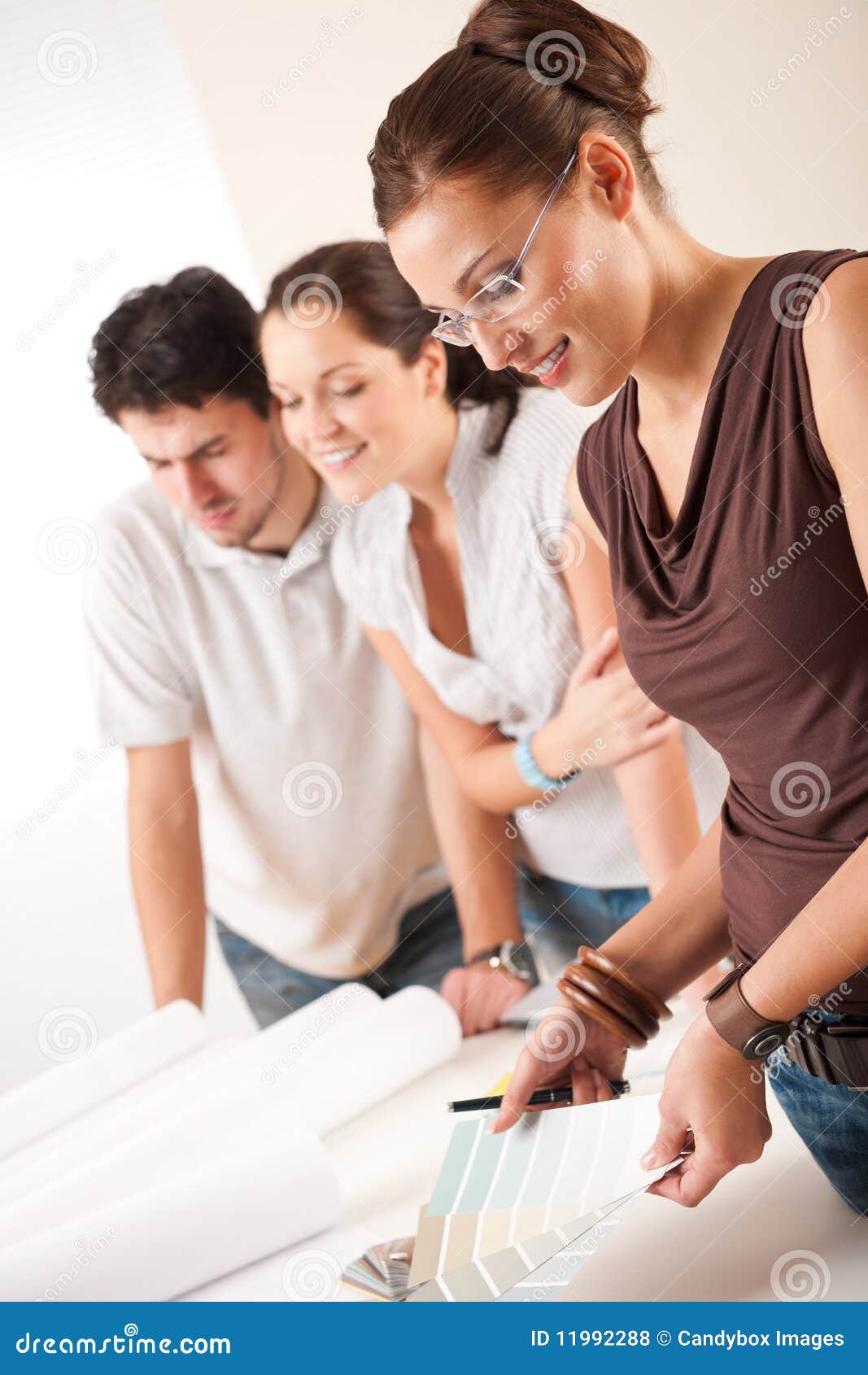 Female Interior Designer with Two Clients Stock Photo - Image of ...