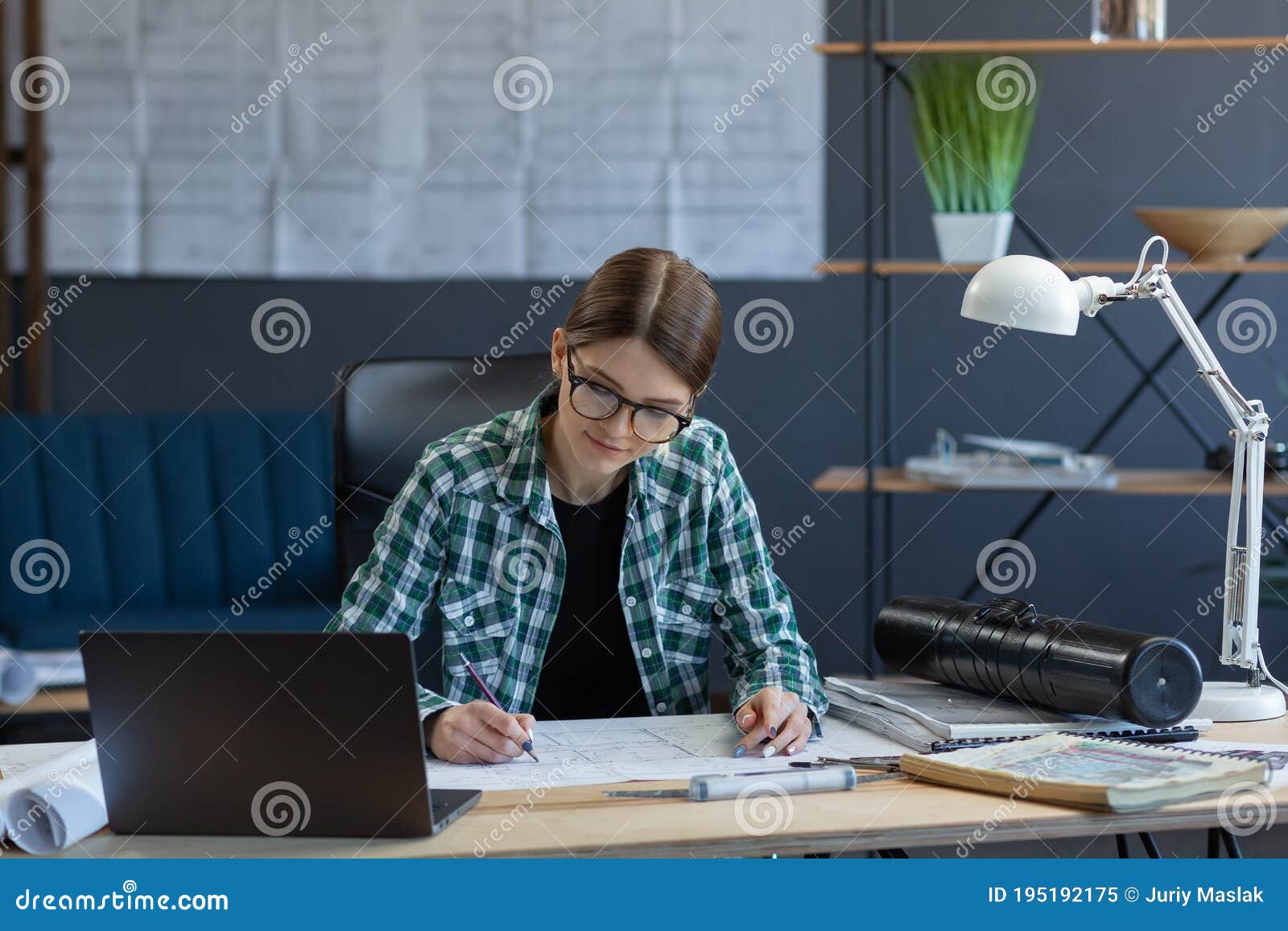 Female Interior Designer Working in Office with Laptop. Architect ... Female Interior Designer Working in Office with Laptop. Architect ...