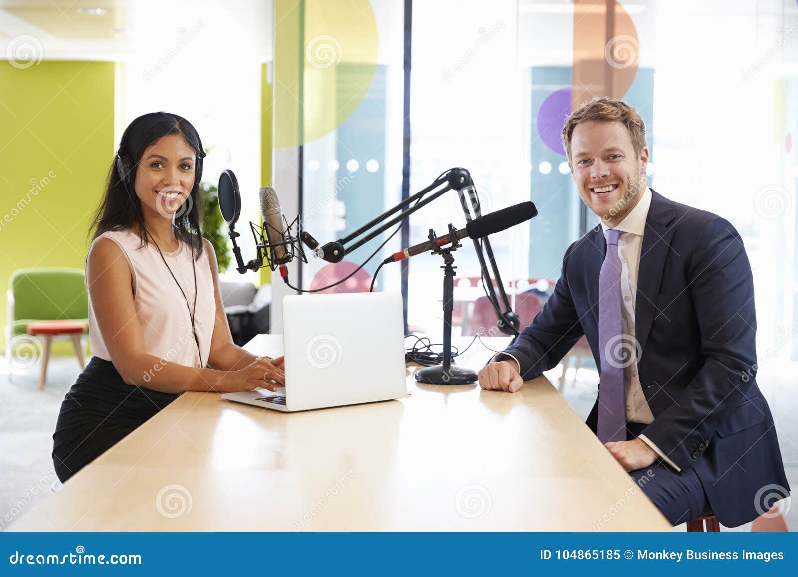 Female Interviewer and Guest in a Studio Smiling To Camera Stock Image ...