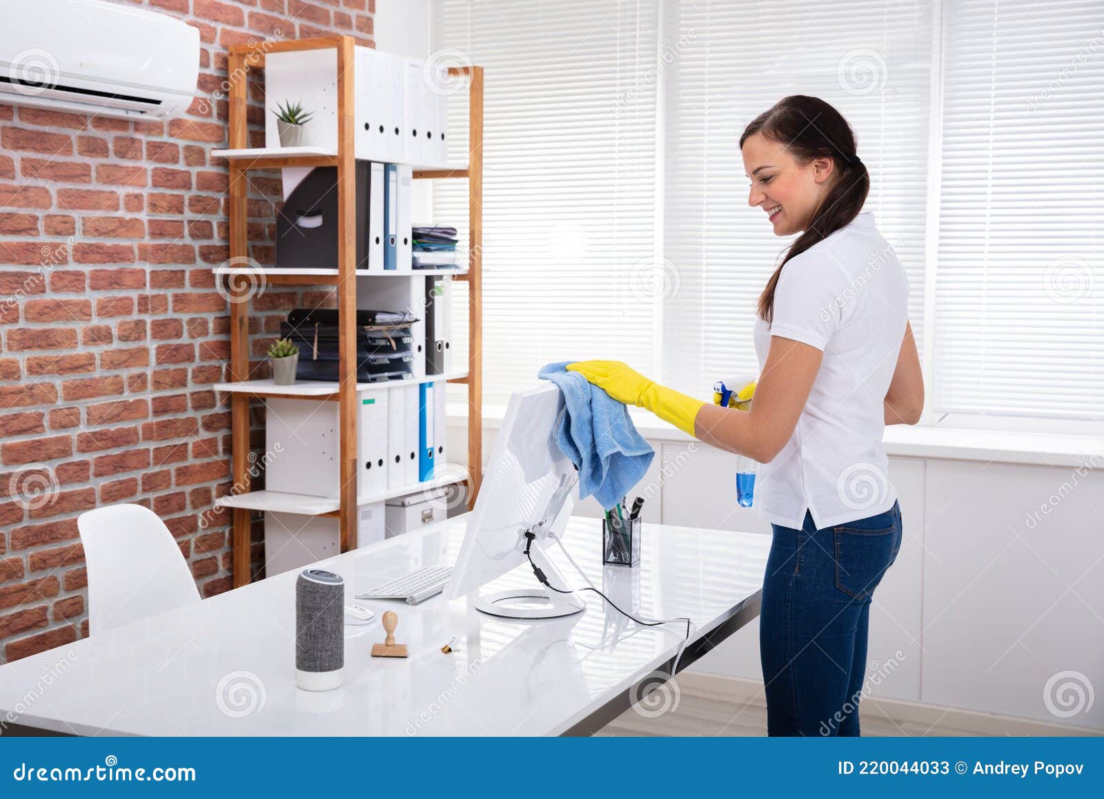 Female Janitor Cleaning Computer in Office Stock Image - Image of ...