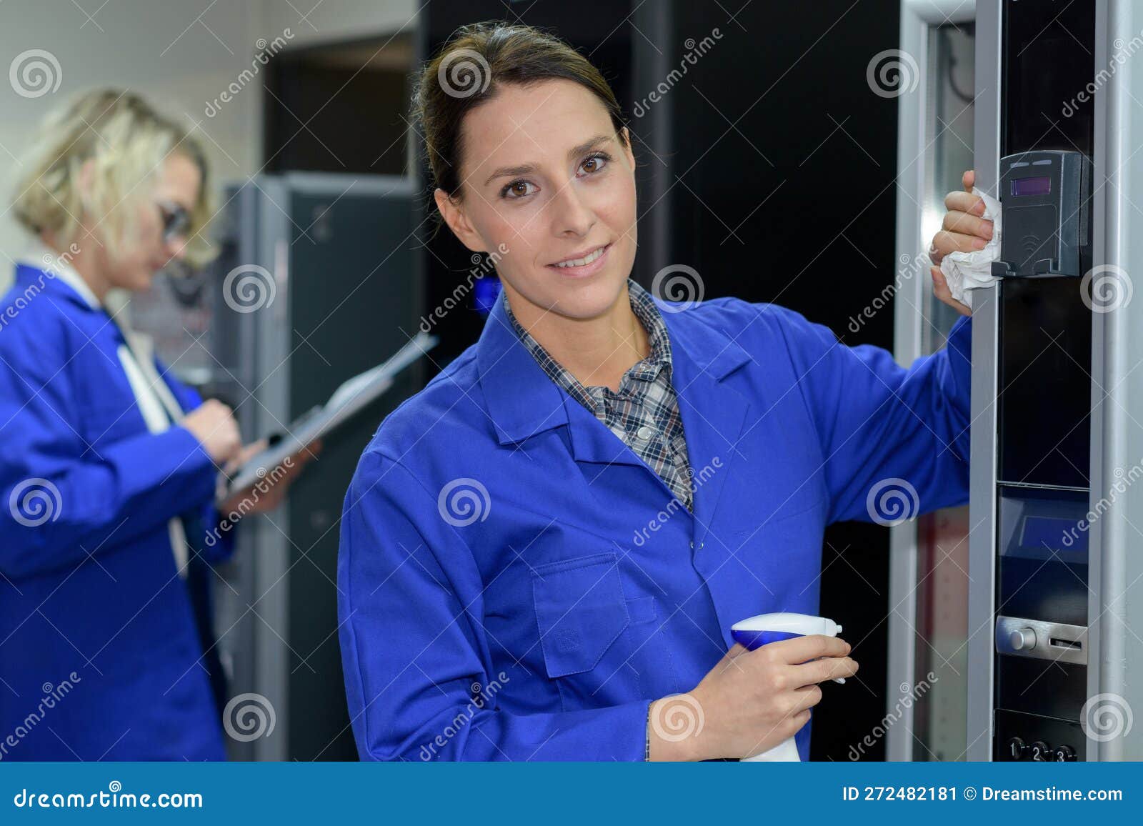Female Janitor Spraying and Posing Stock Image - Image of female ...