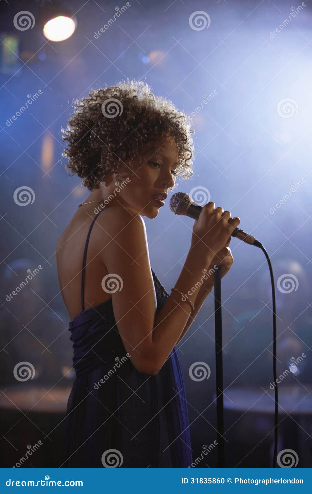 Jazz Singer On Stage At Dress Rehearsal Or After Performance Under ...