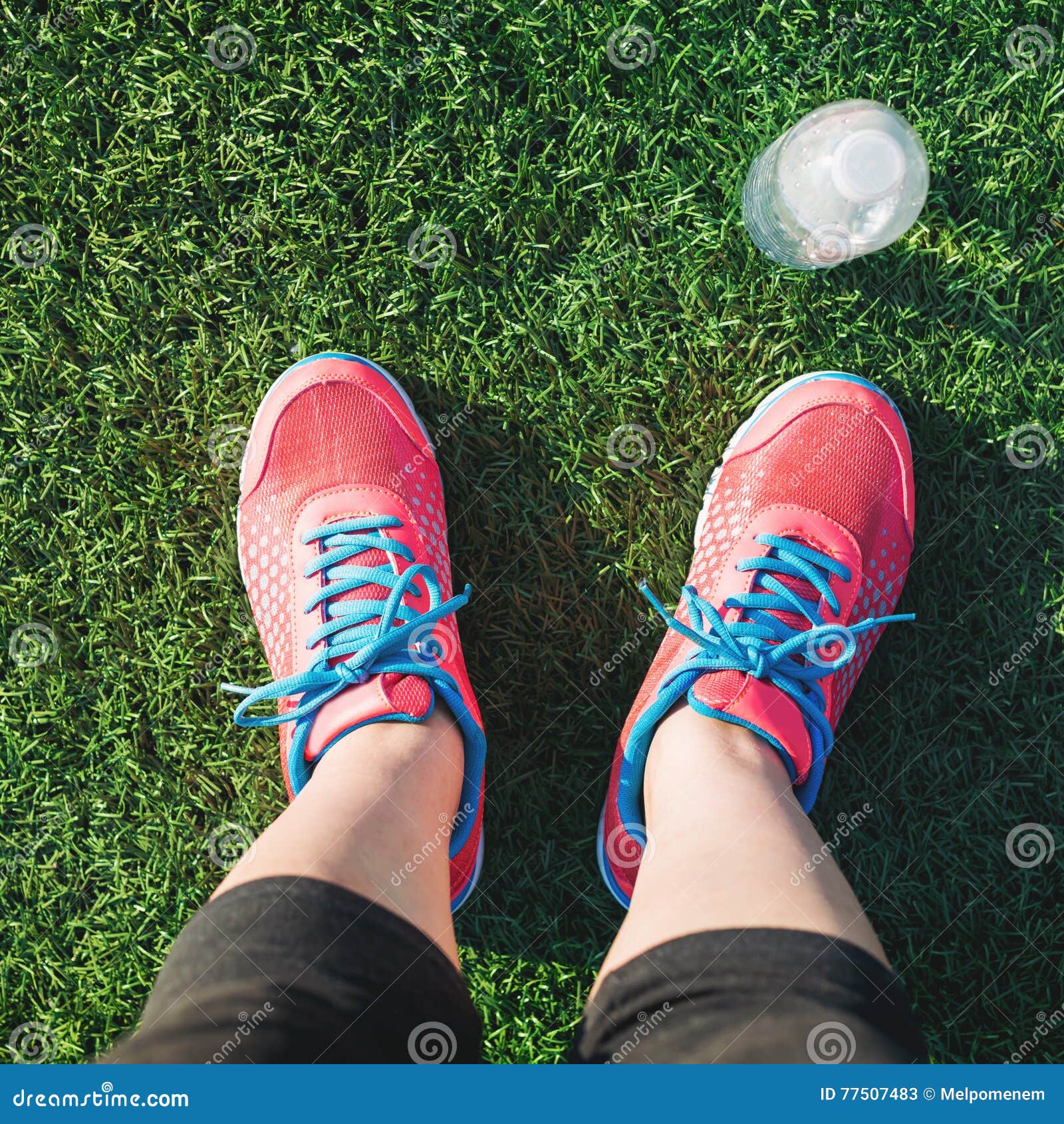 Female Jogger Looking Down at Her Feet Stock Image - Image of grass ...