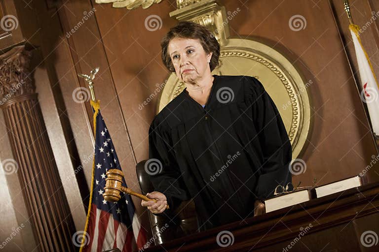 Female Judge Forming a Judgment Stock Photo - Image of indoors ...