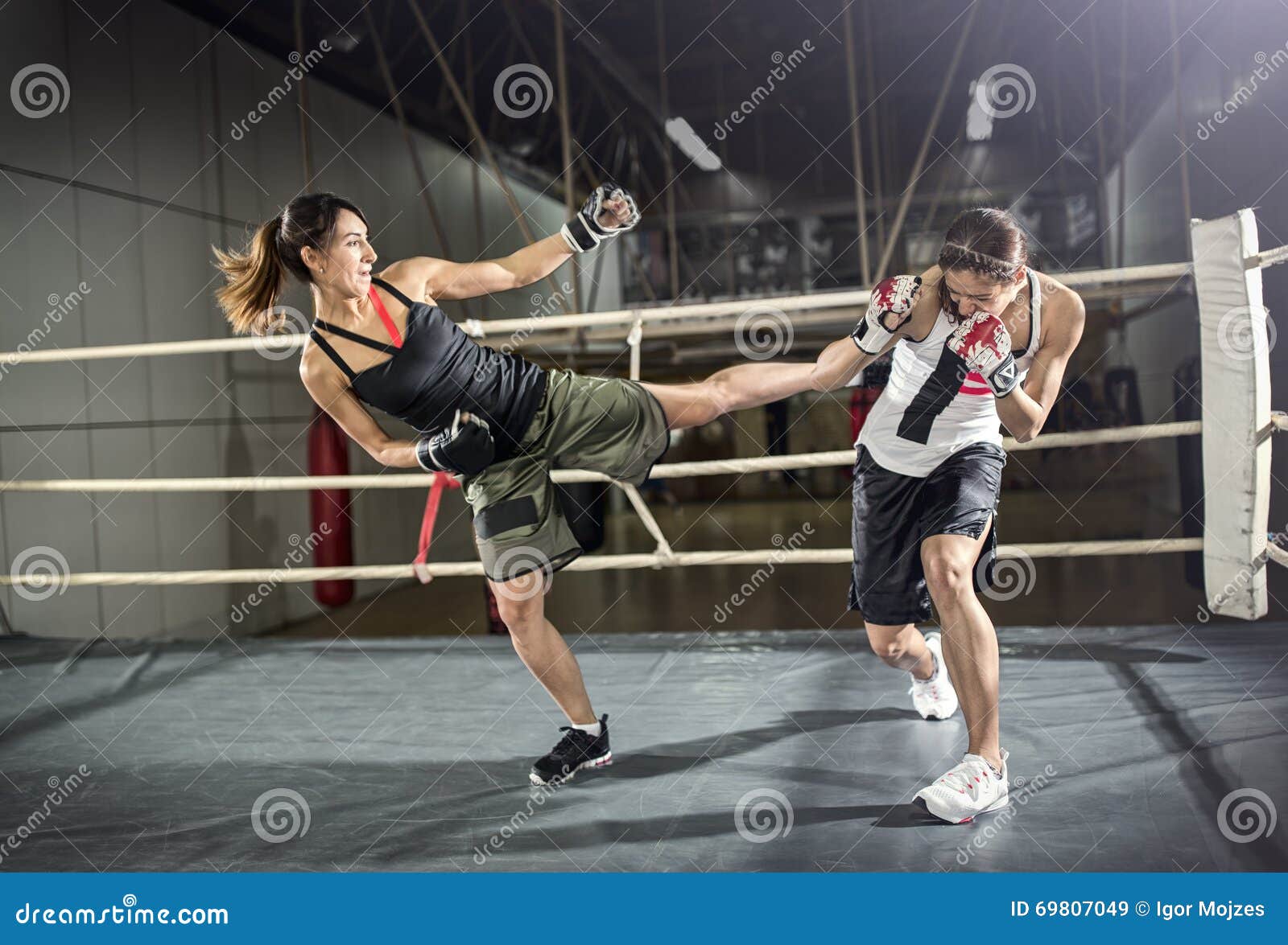 Boxer Practicing Her Punches At A Boxing Studio. Close Up Of A Male ...