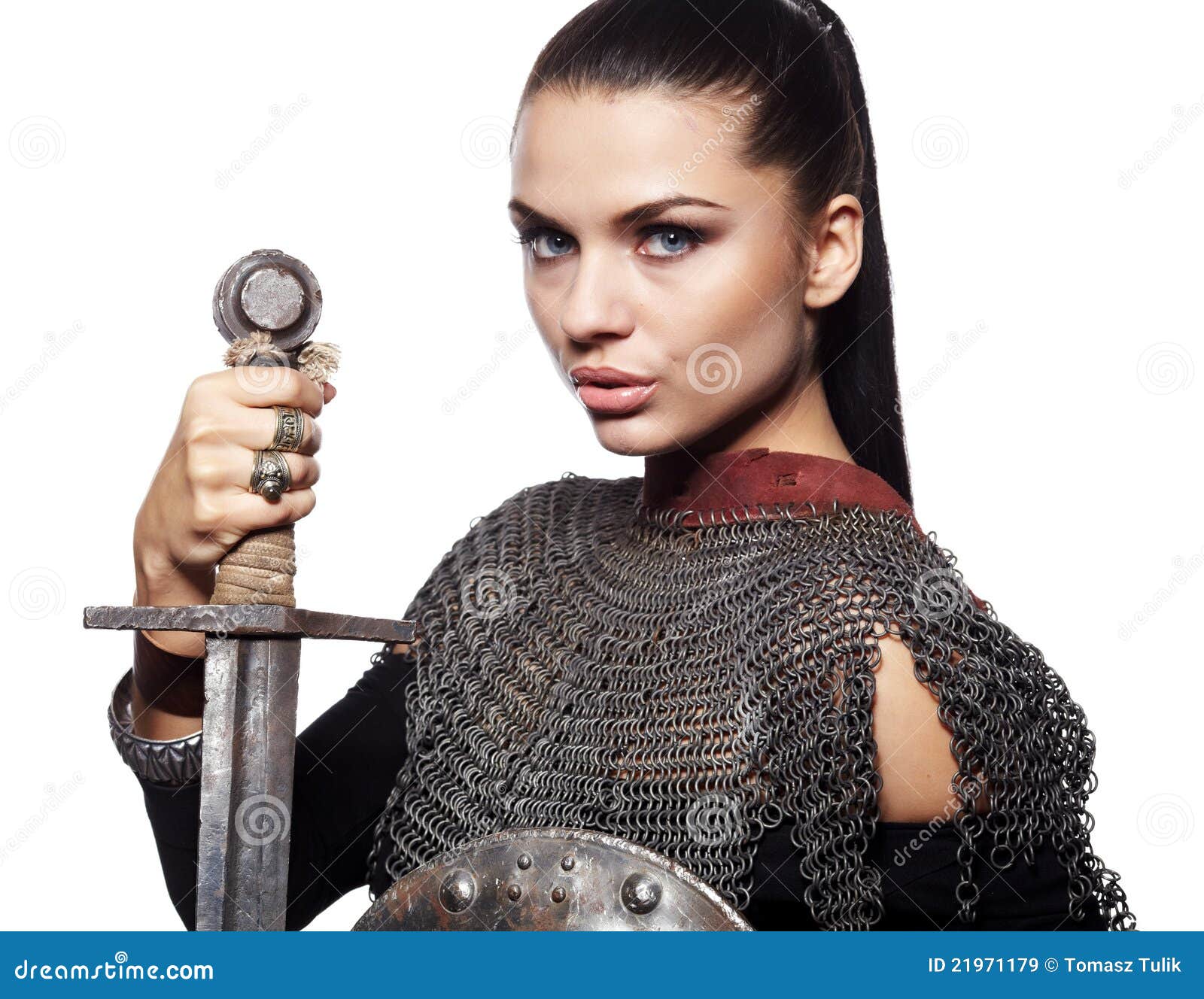 A Female Warrior With A Sword Poses On A Stump In The Forest. Wushu ...