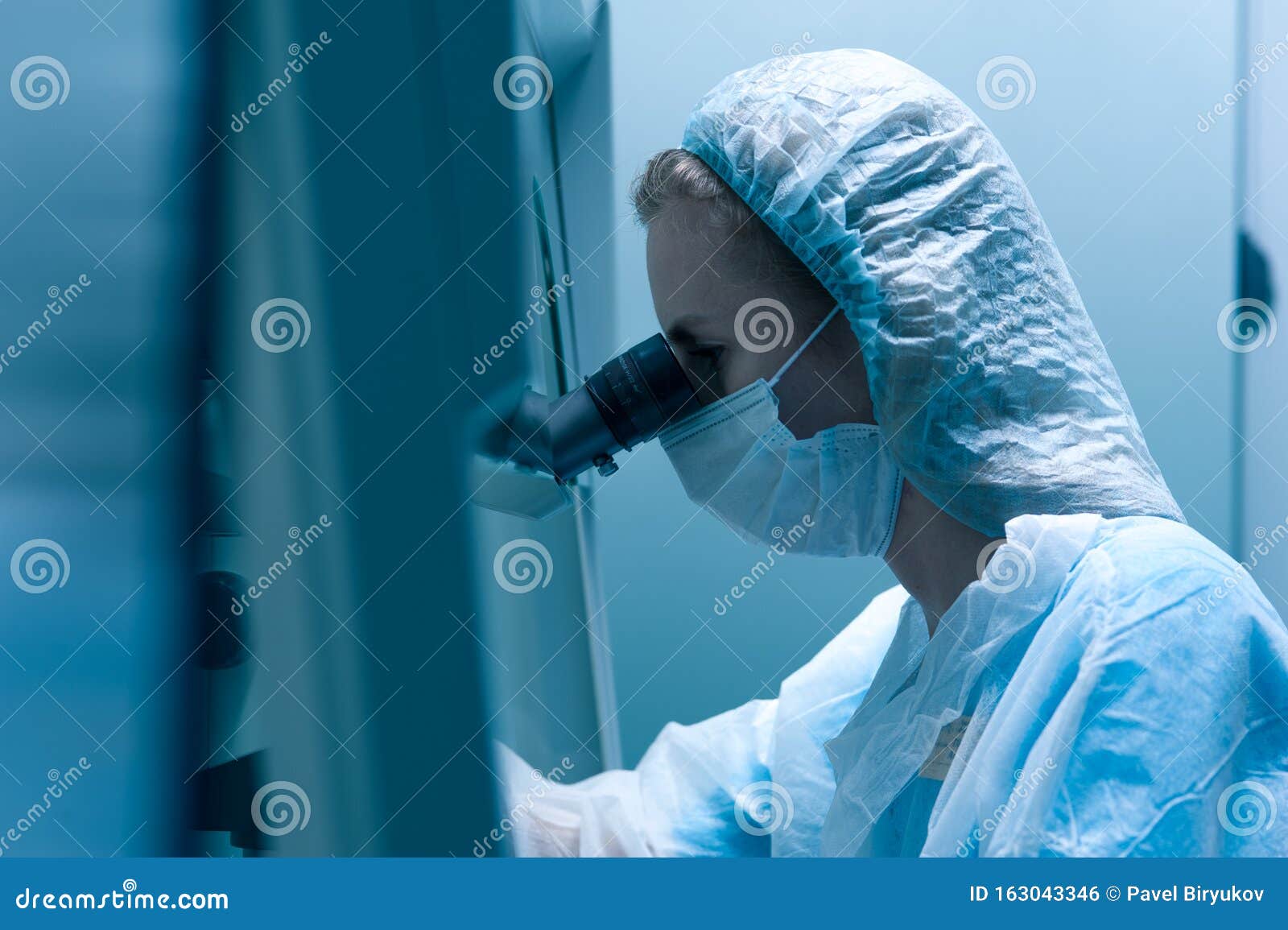 Female Lab Technician in a Protective Mask Stock Photo - Image of ...