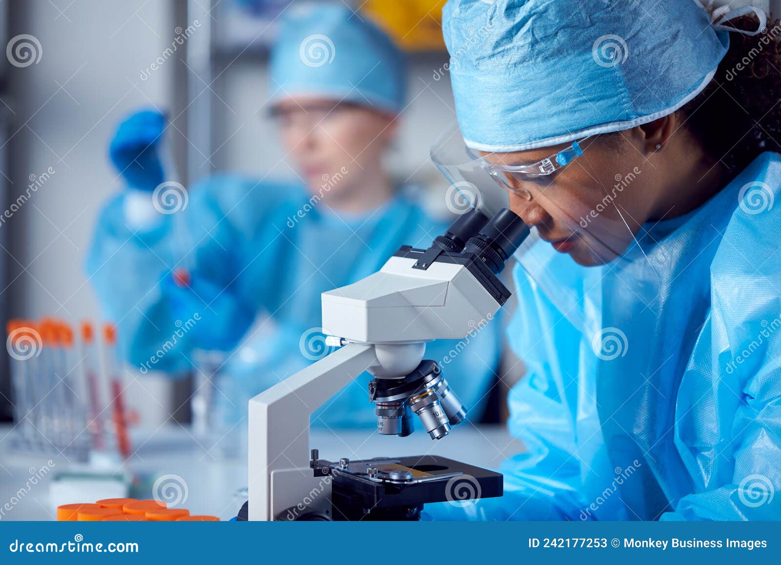Female Lab Workers Wearing PPE Researching in Laboratory with ...