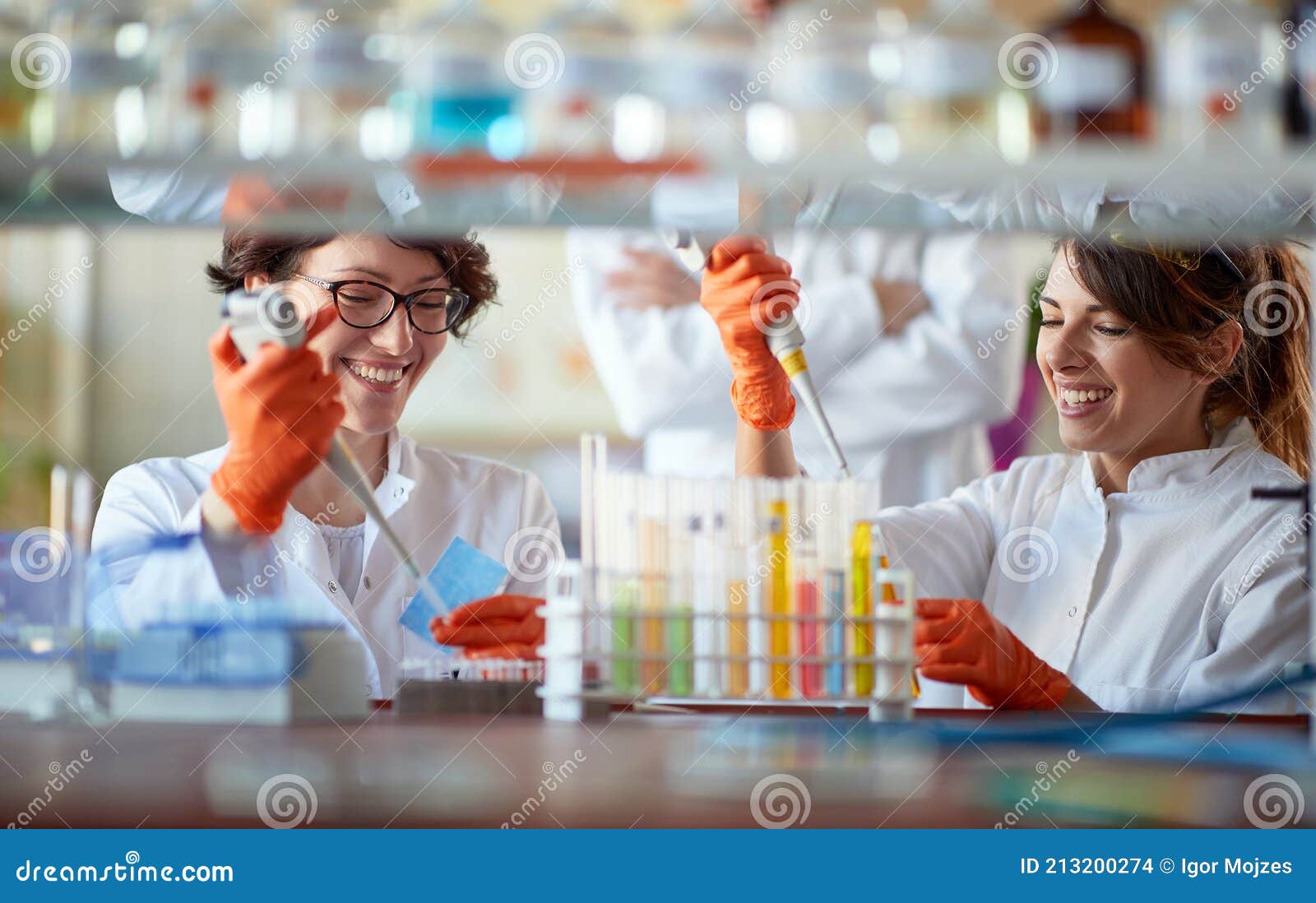 Female Laborants Analyzing Samples Together Stock Photo - Image of ...
